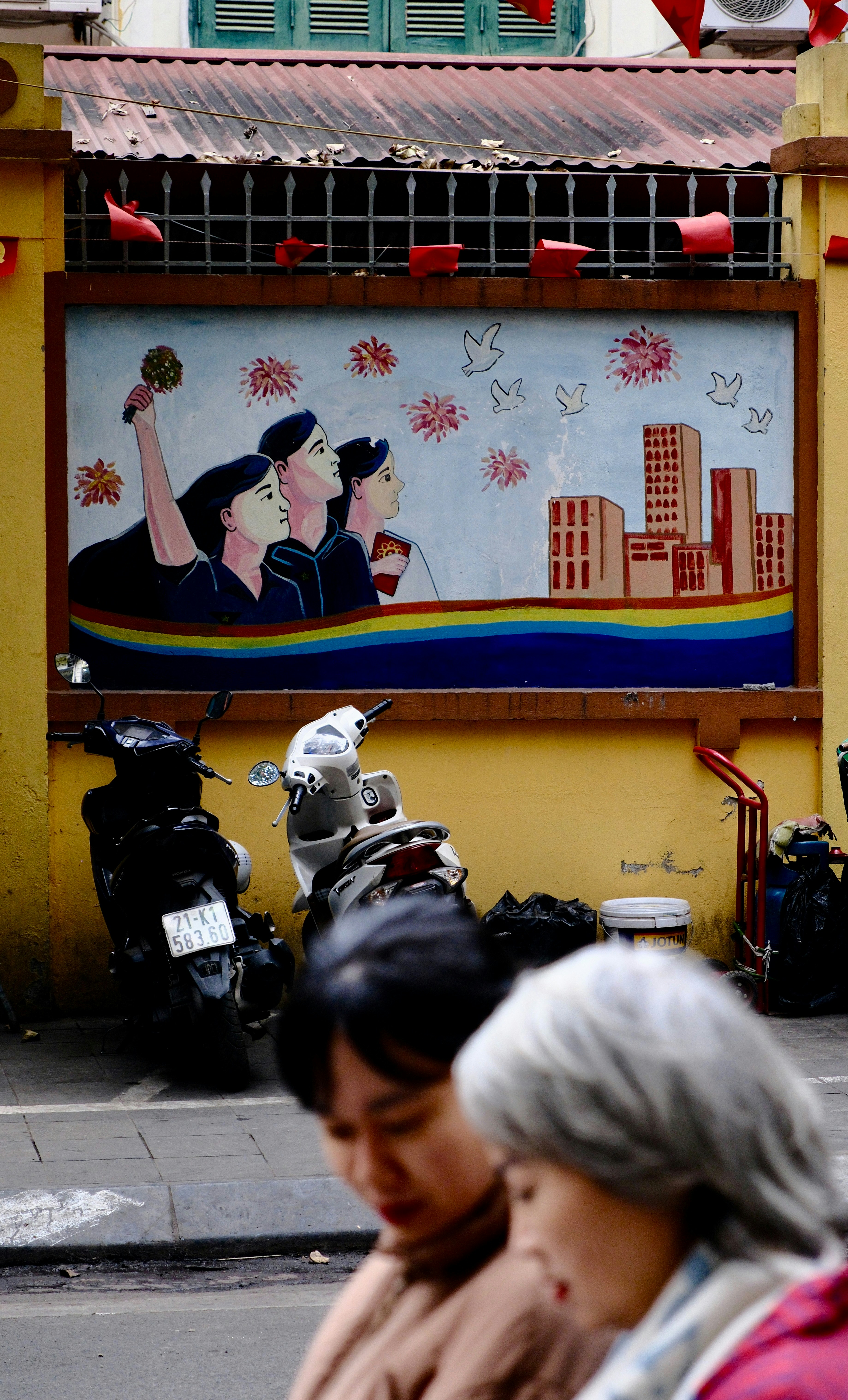River of Color: Mural, Motorbikes, and Moving Faces