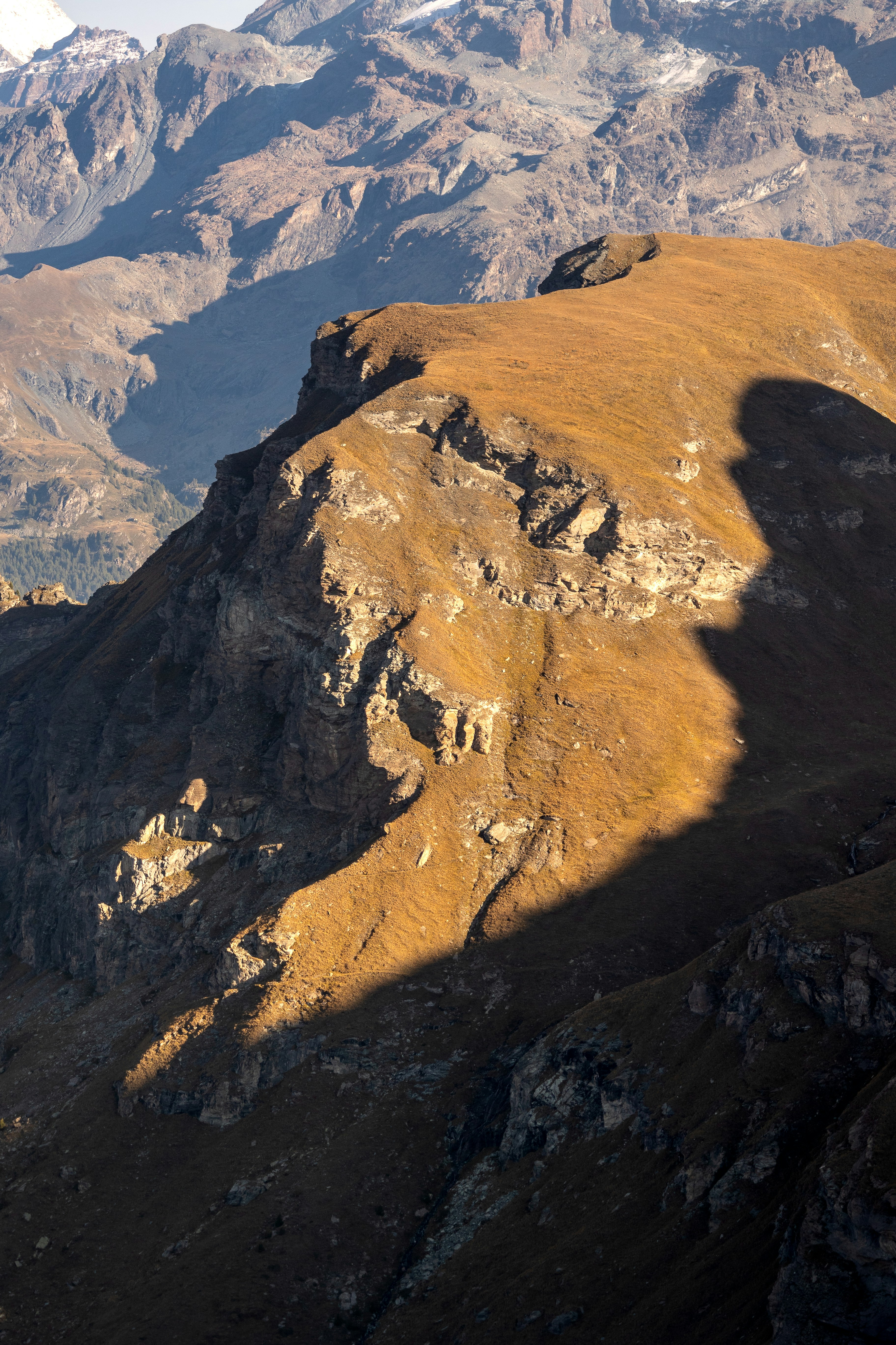 Golden Ridge: Shadow and Light over a Alpine Crest