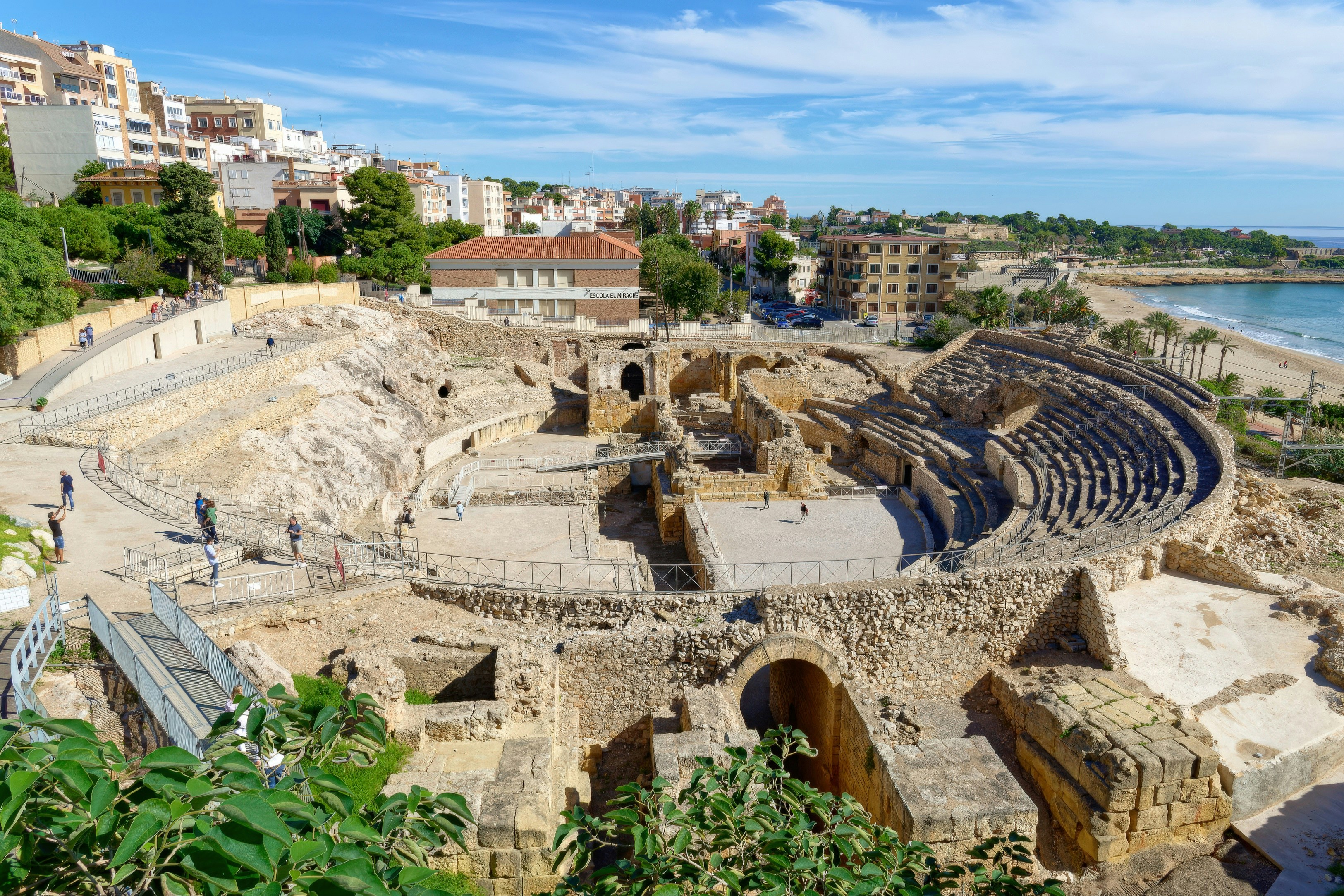 Ancient roman amphitheater overlooking the mediterranean sea