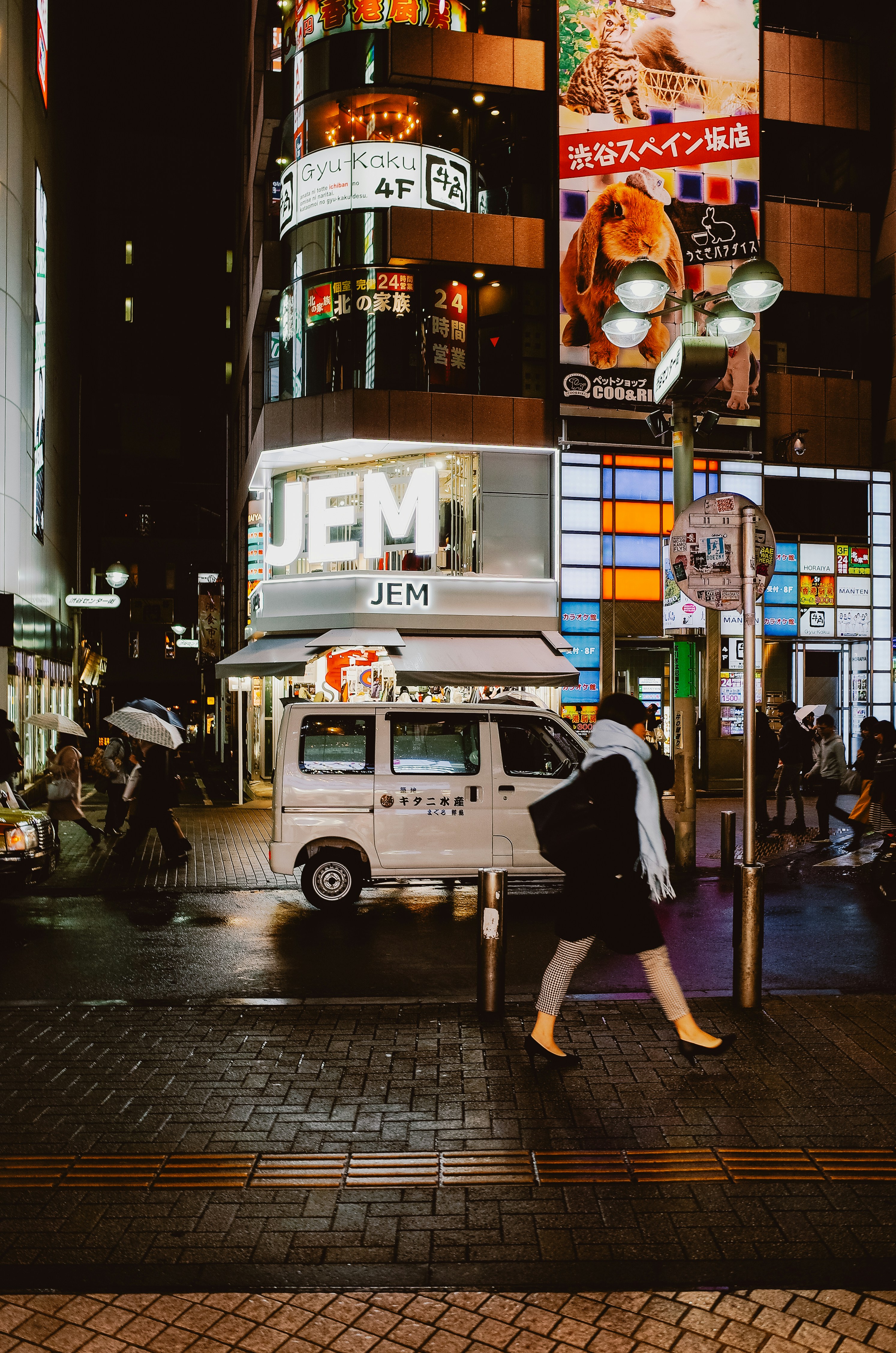 Neon Rhythm: A Night Walk Past JEM’s Glowing Facade