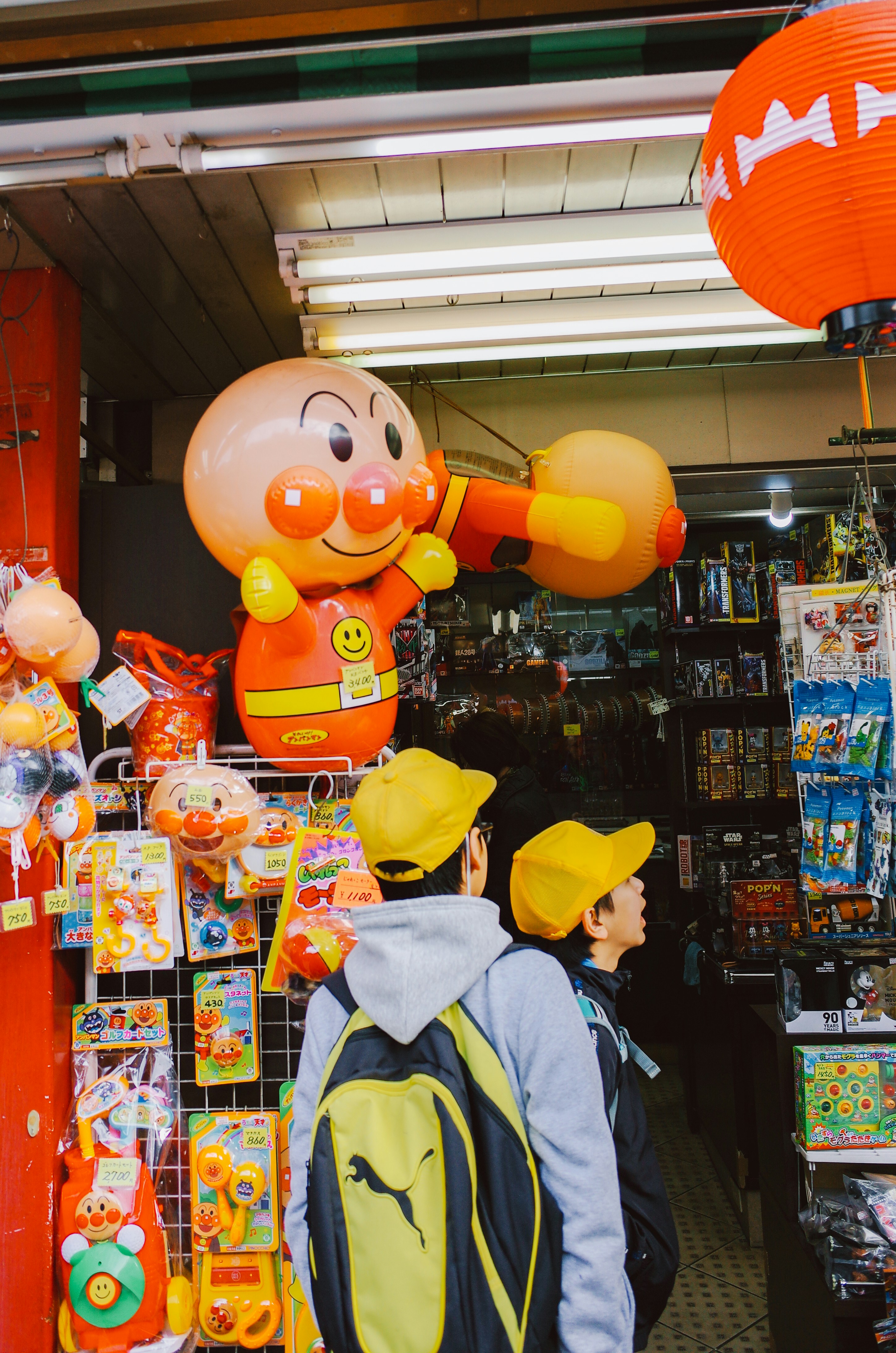 Toy-cartoon Punching Hero Guards the Storefront