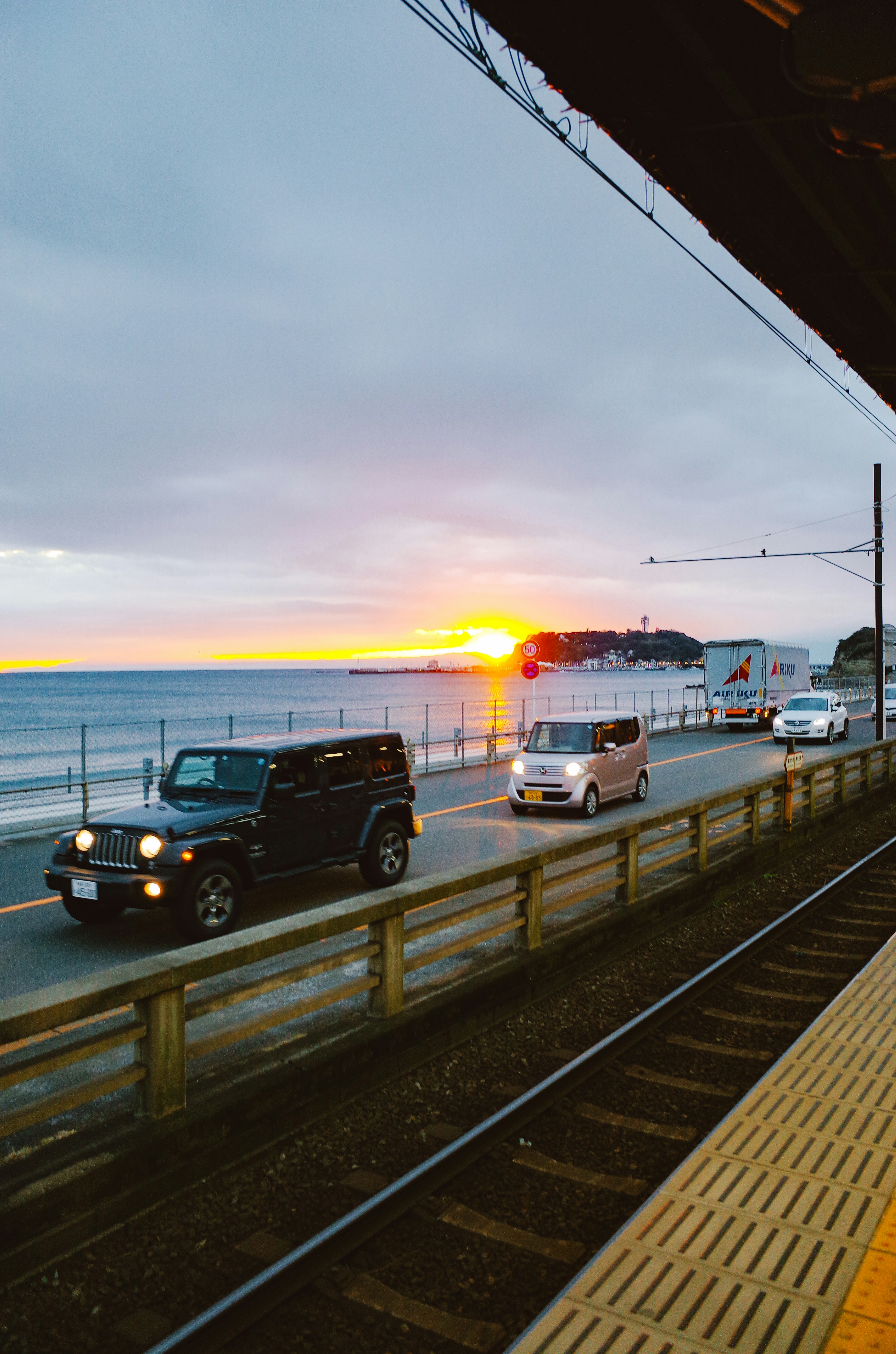 Sunset Rail Stop: Coastal Roadside Rhythm