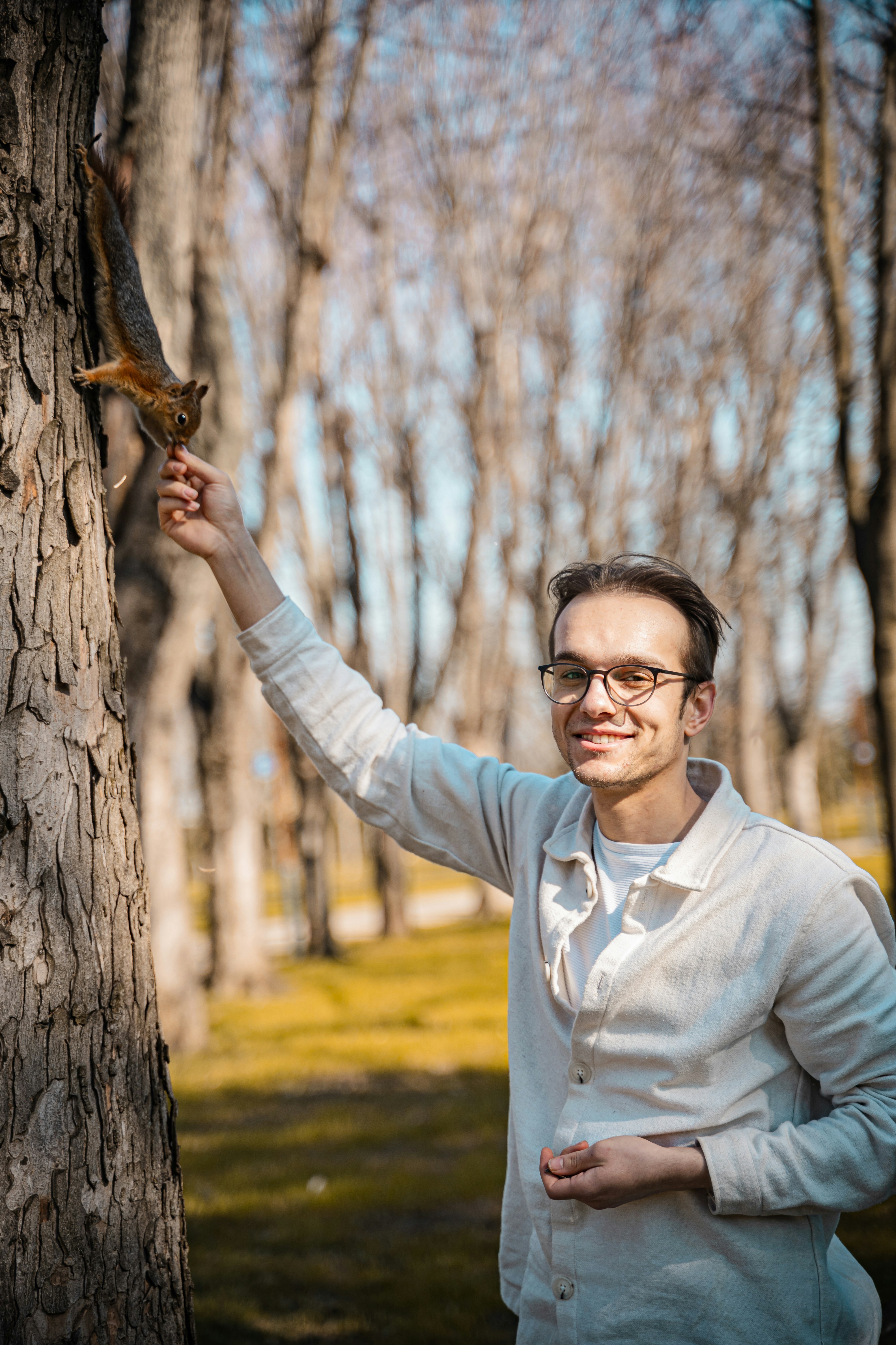 Pocket of Mischief: A Squirrel Scene with a Friendly Gardener