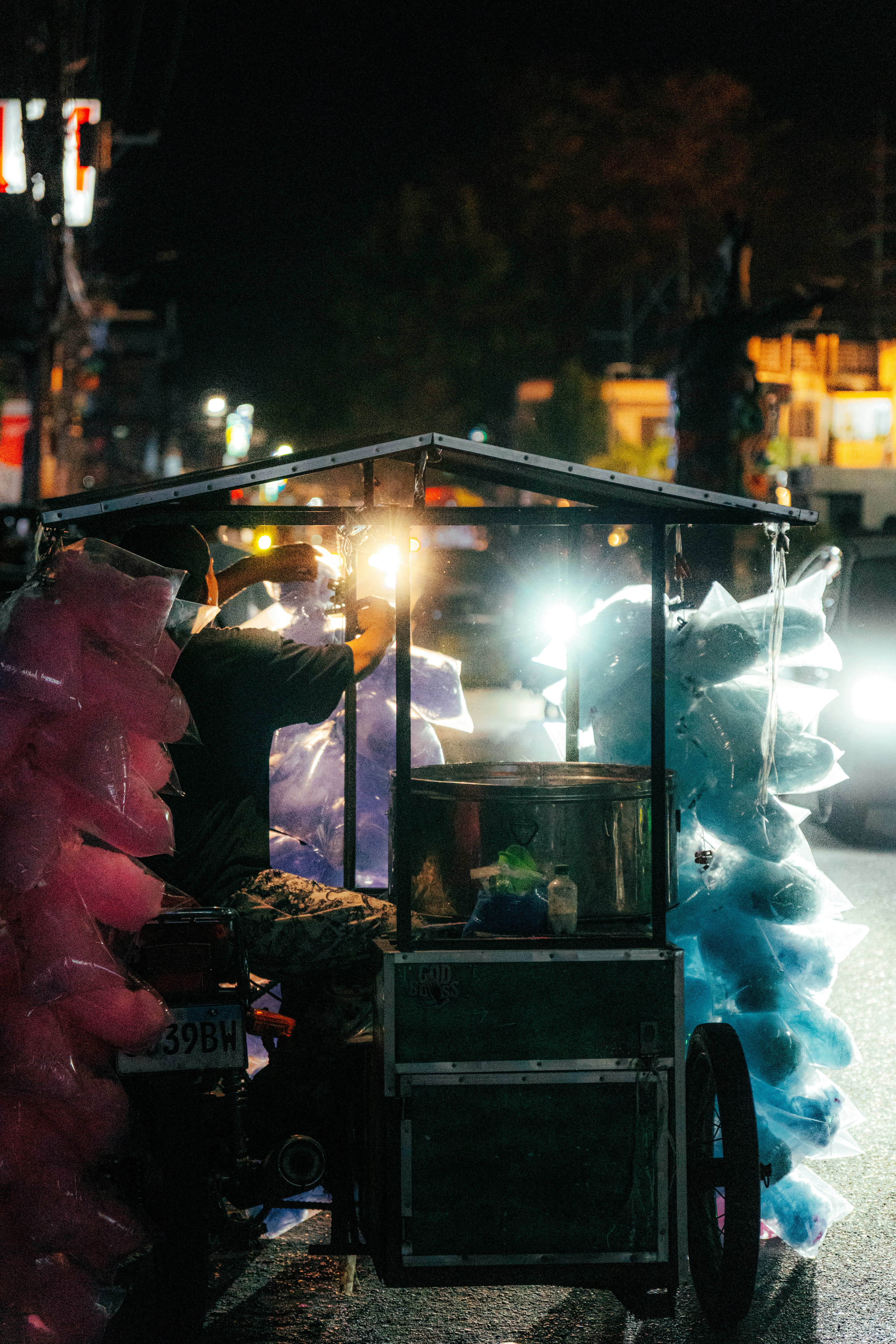 Night Market Cart Under Neon Lights: Cotton Candy Cones and a Glimmering Lantern