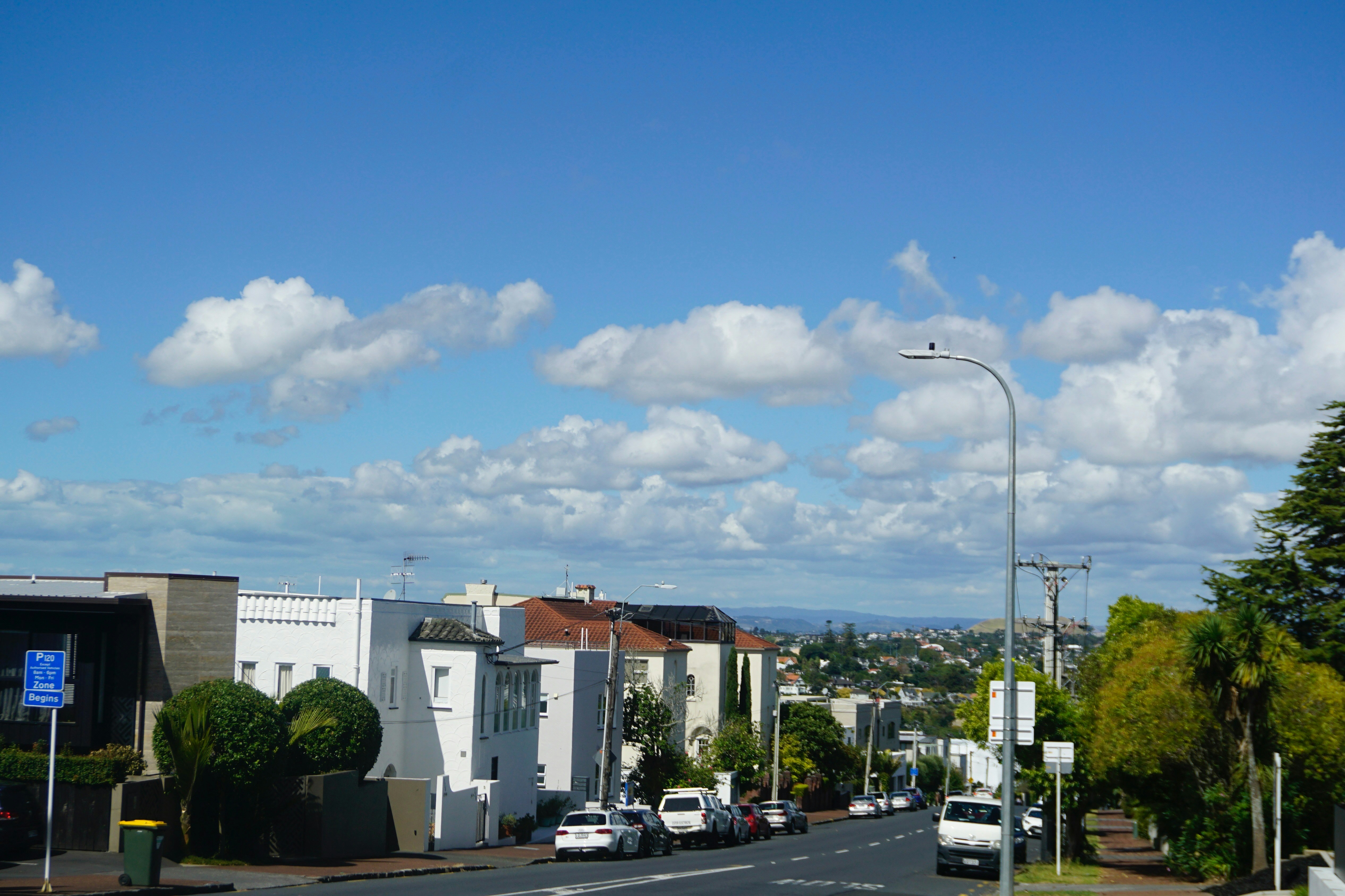 Sunlit Street Toward the Horizon