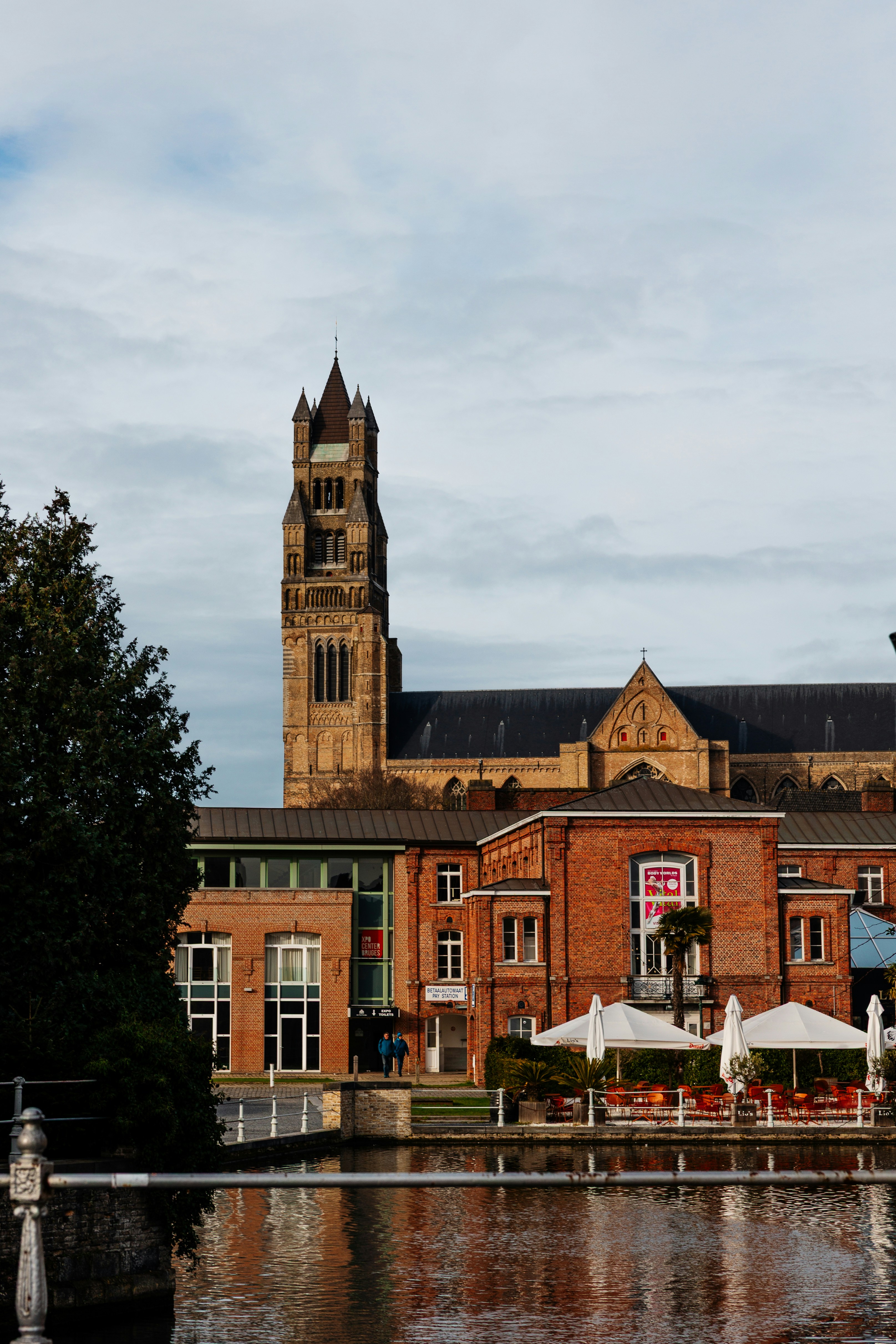 Waterside Cathedral: Brick Townscape with Waterfront Café