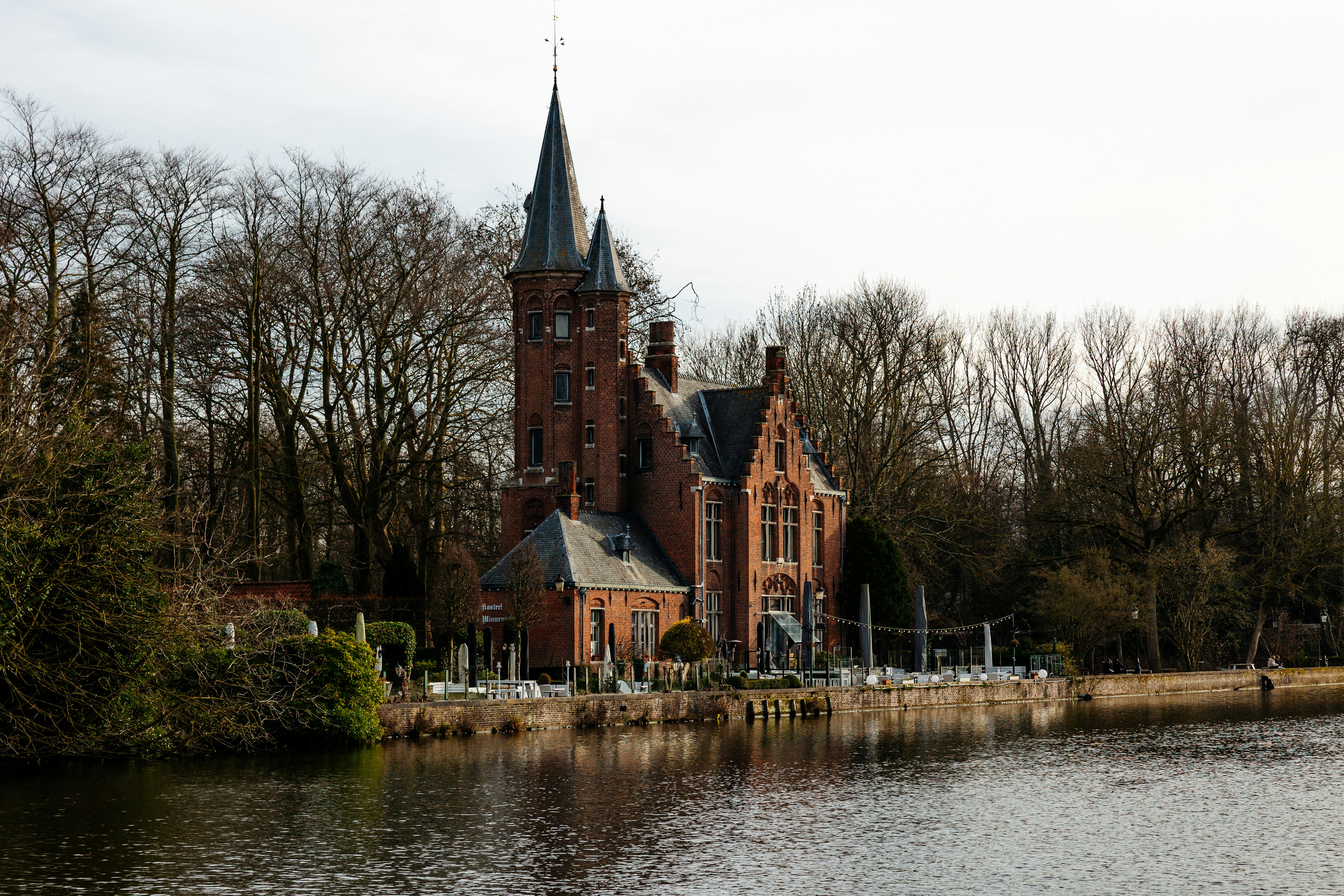 Brick Riverside Castle by the Quiet Canal