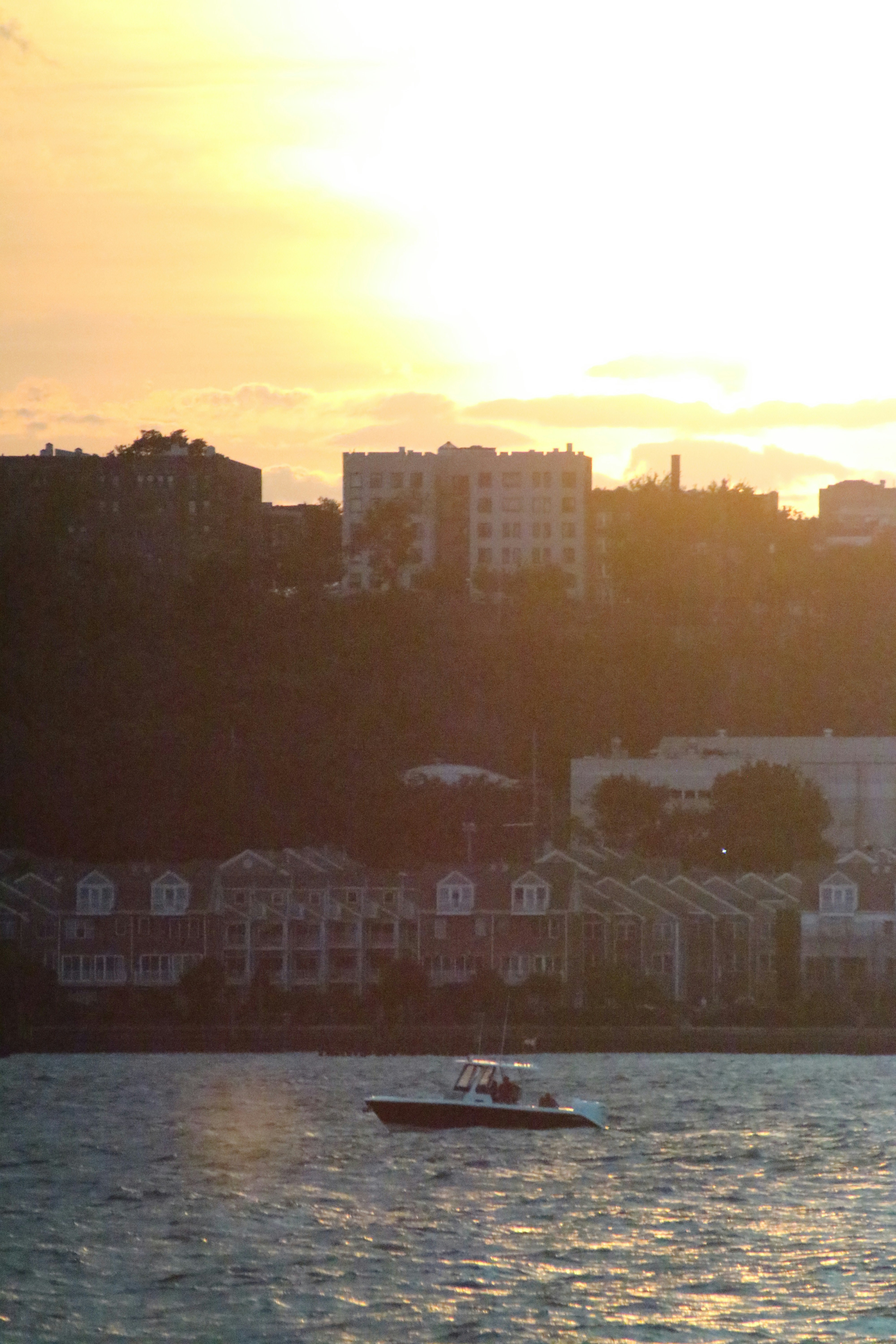 Golden Hour Boat on Quiet Waterfront