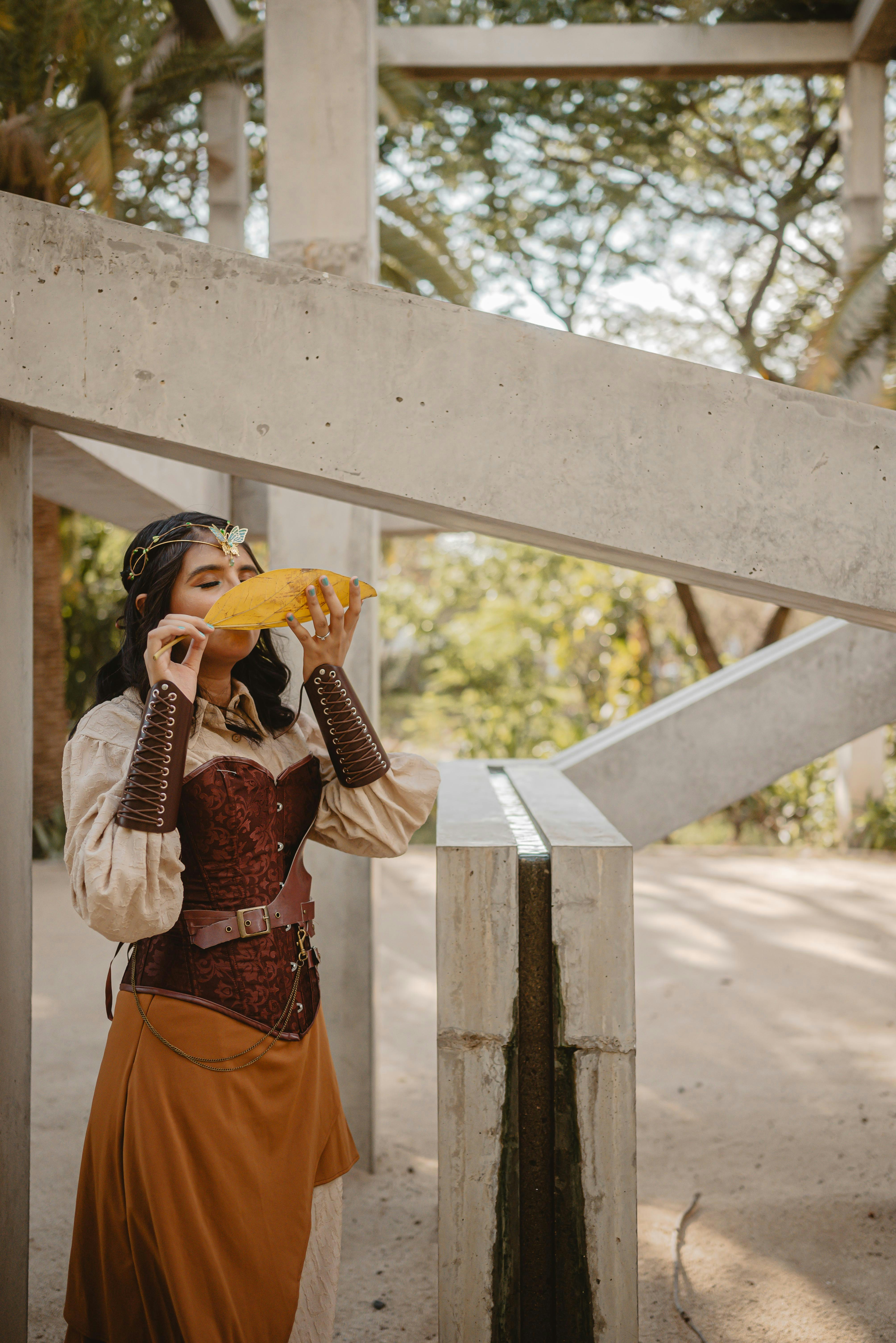 Citrus Echo: A Portraitful Snack Amid Concrete Angles