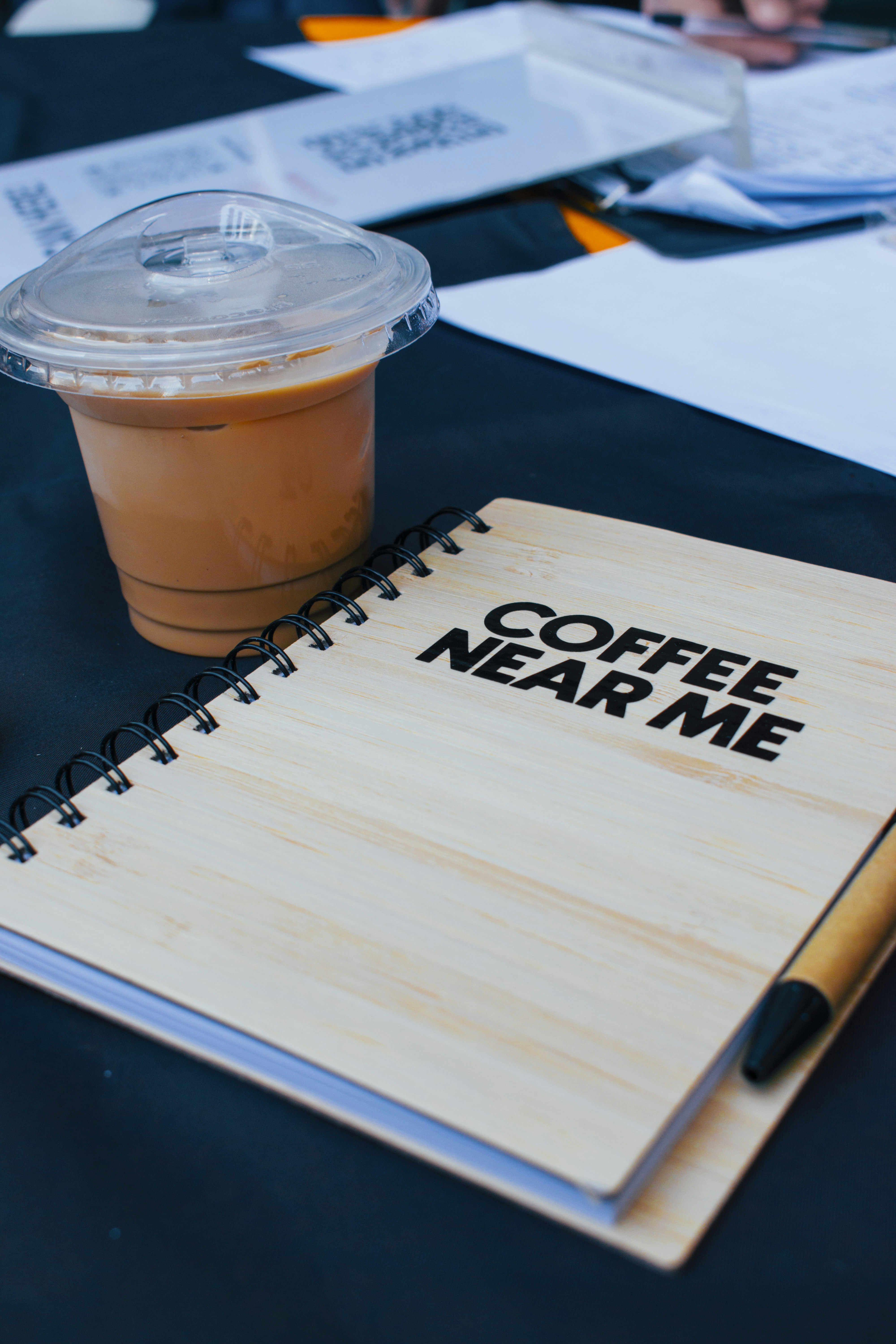 Notebook with Coffee Label: A Quiet Café Moment in Woodgrain and Ink
