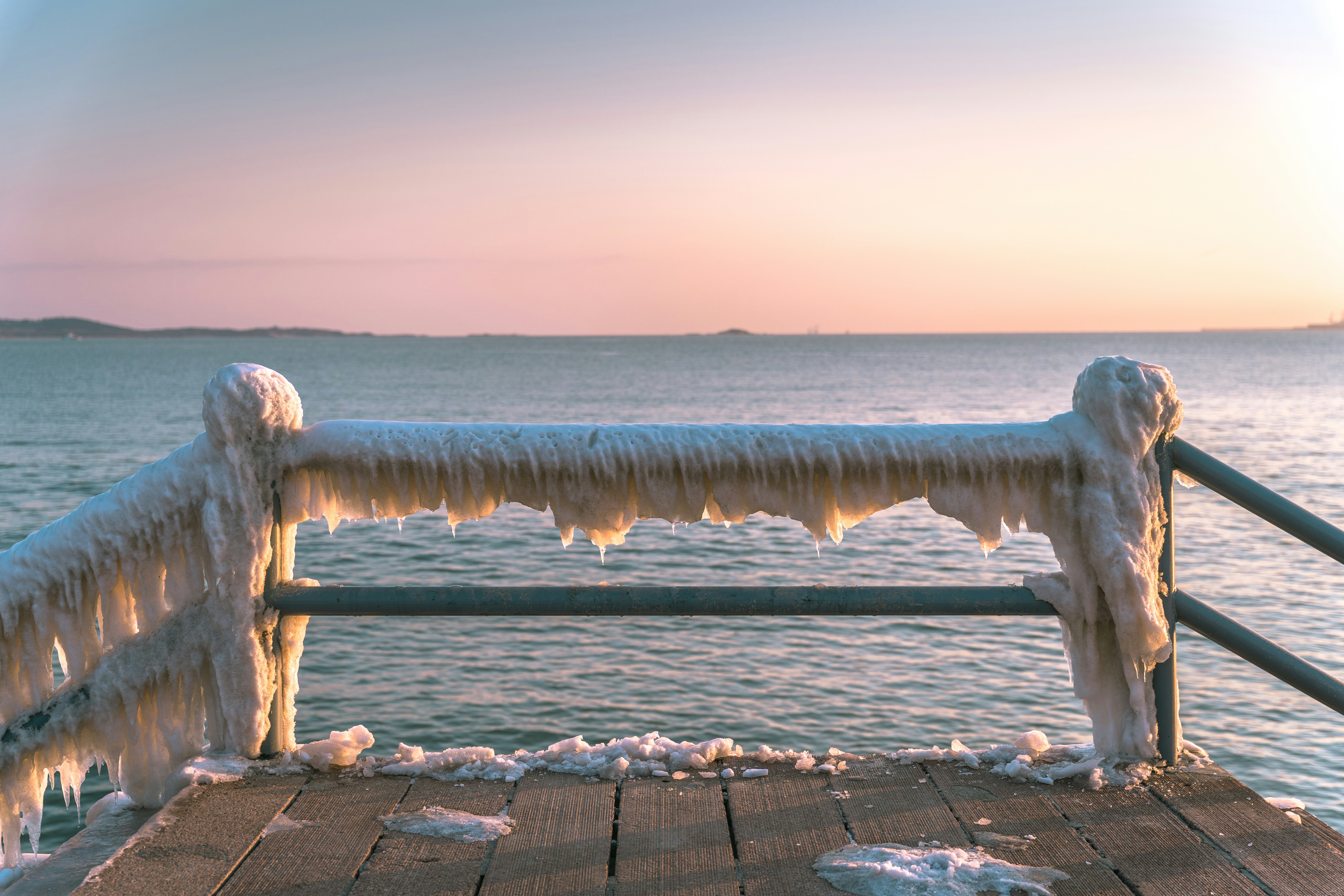 Icy Horizon: Frigid Rail and Quiet Sea