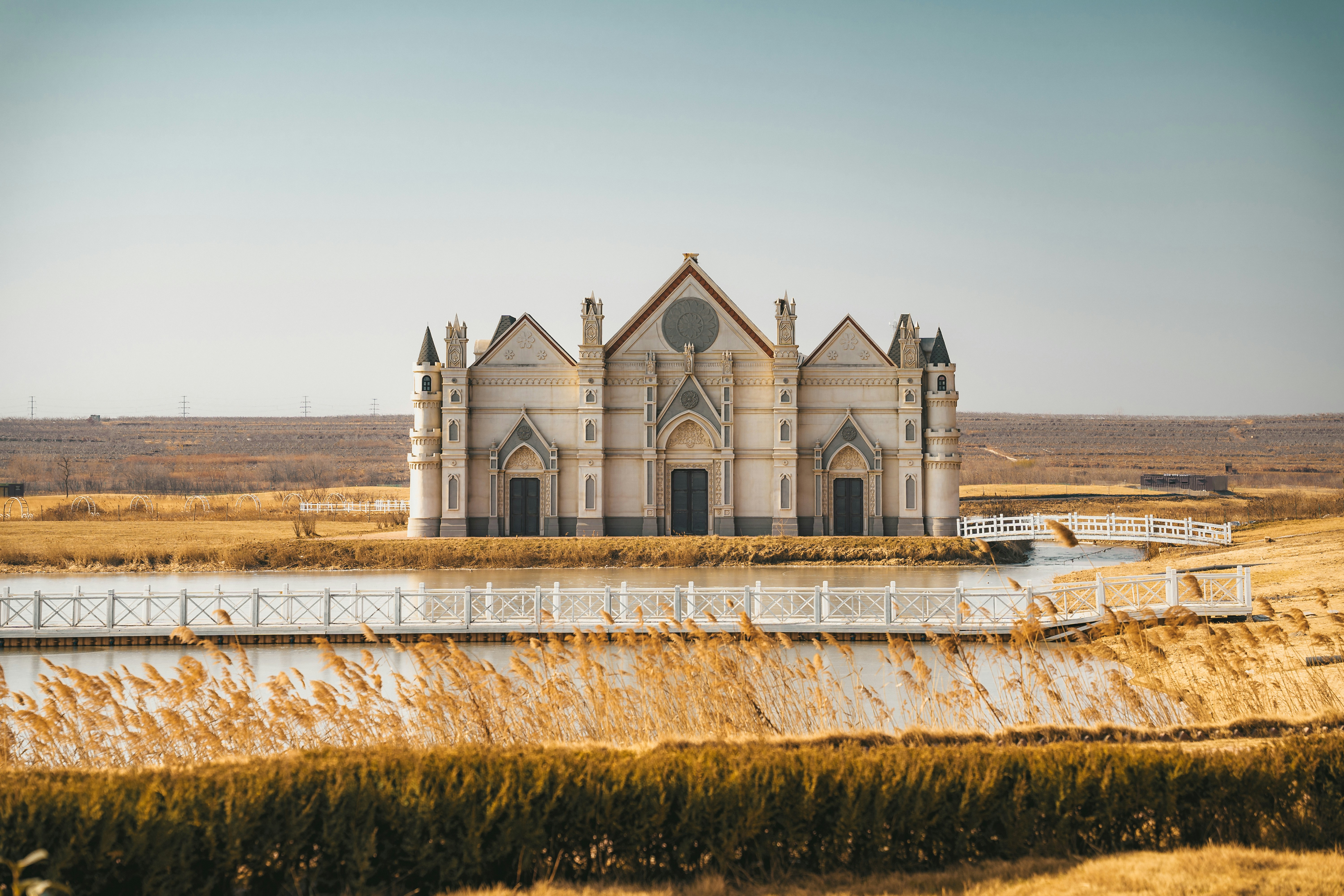 Ornate building with gothic architecture in a dry landscape photo ...