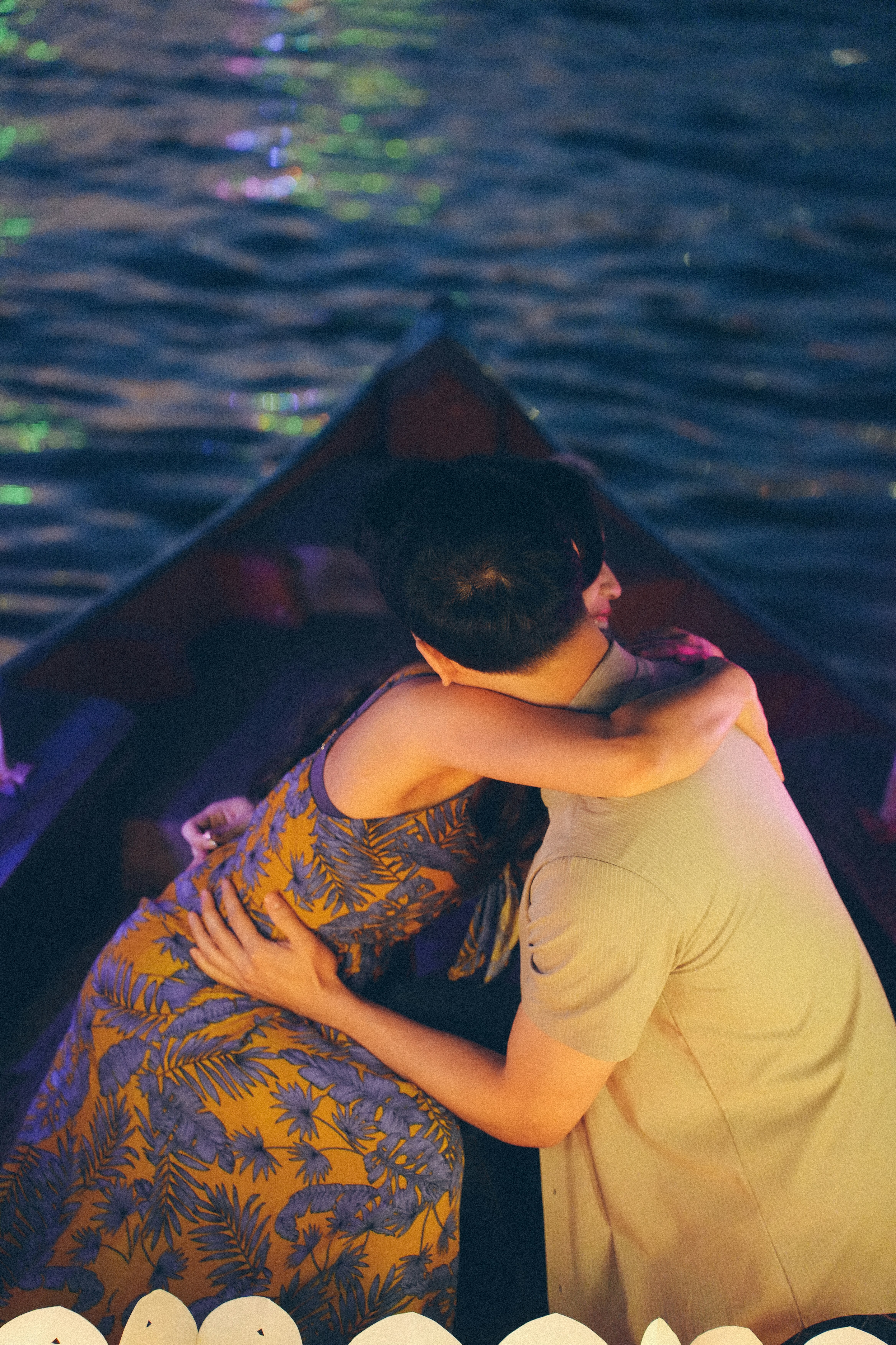 Rowers' Embrace: A Quiet Moment at Dusk