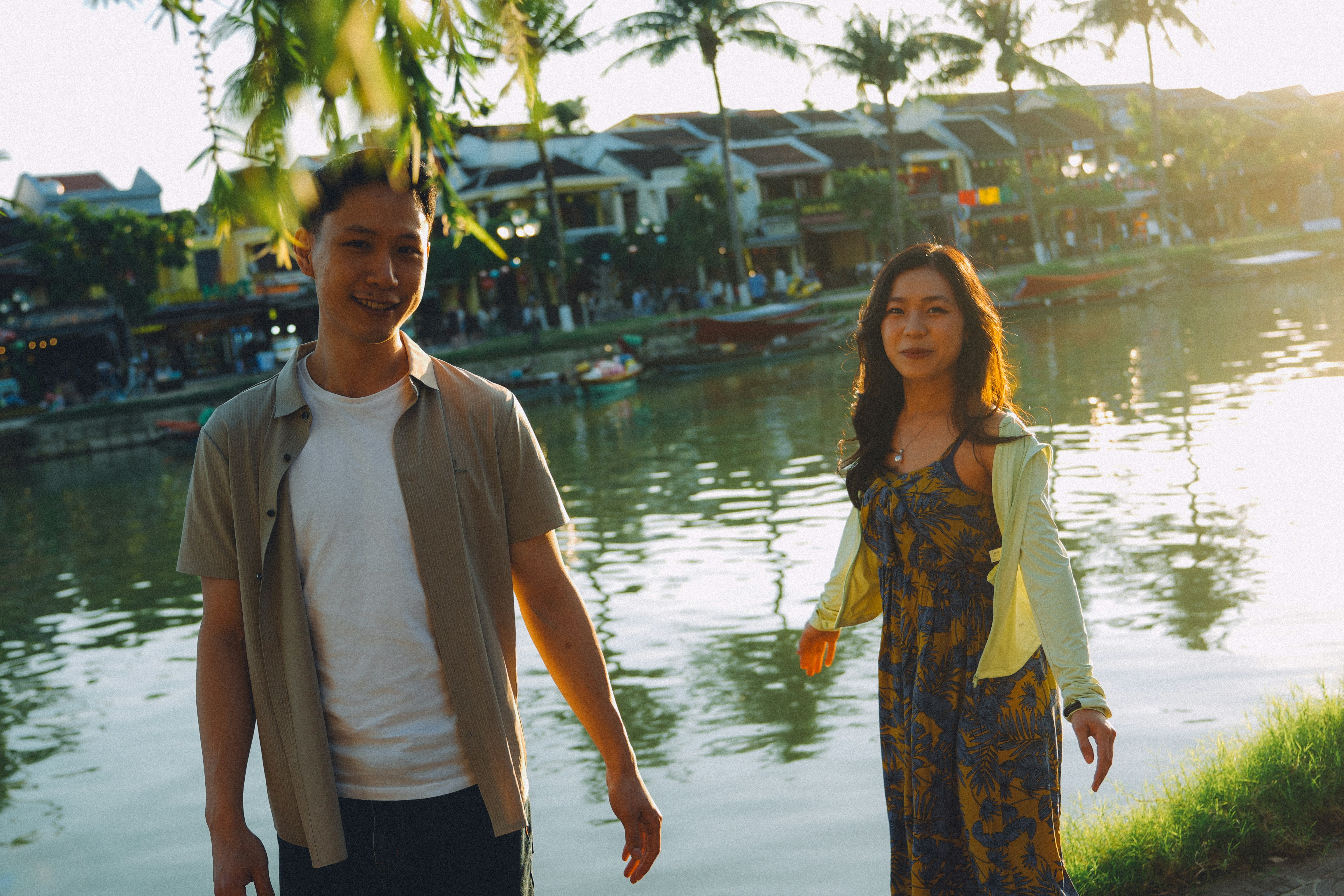 Sunlit Khoi Village Stroll: Friends by the Riverside