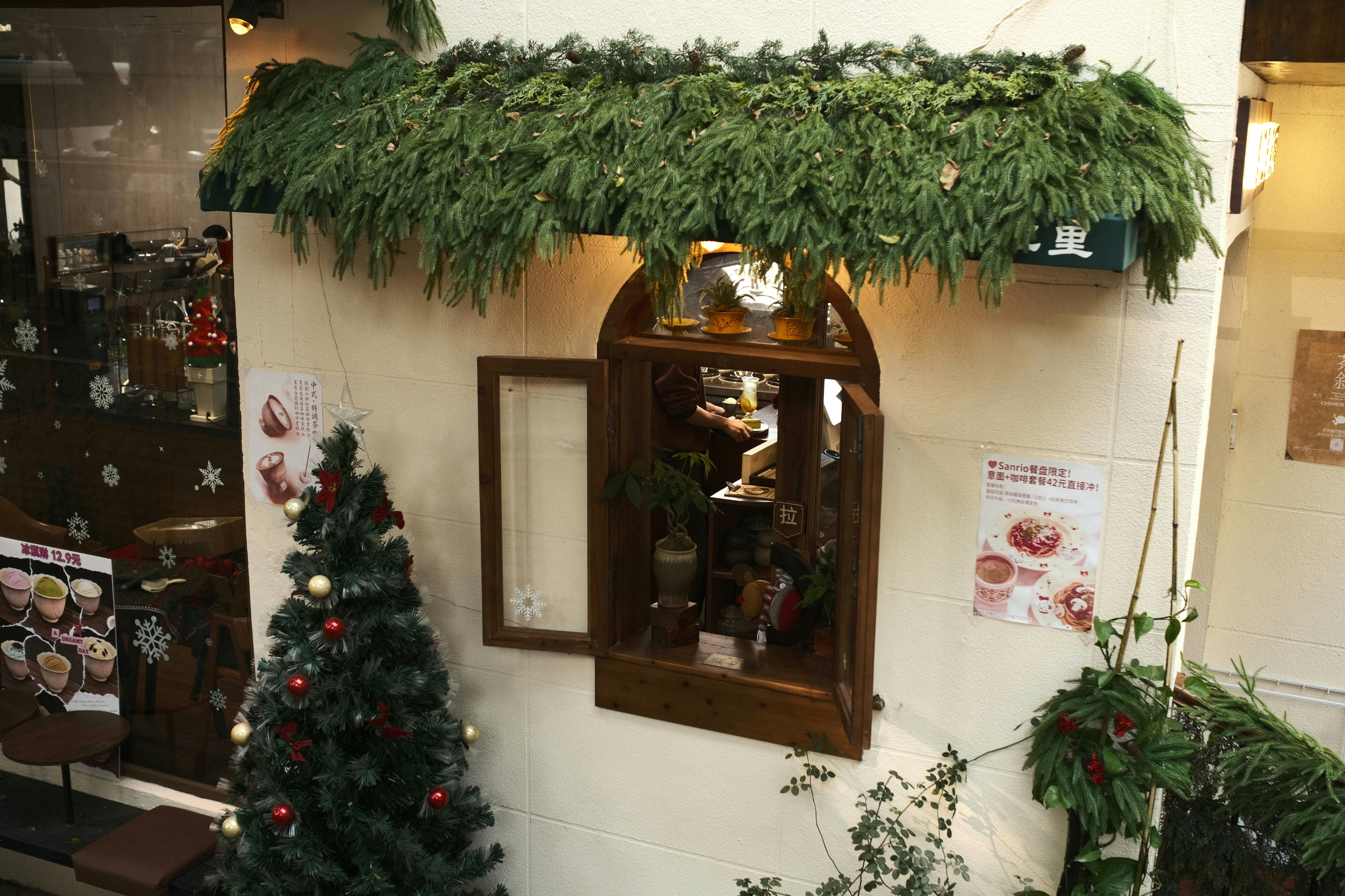 A Festive Window Display Framing a Cozy Interior