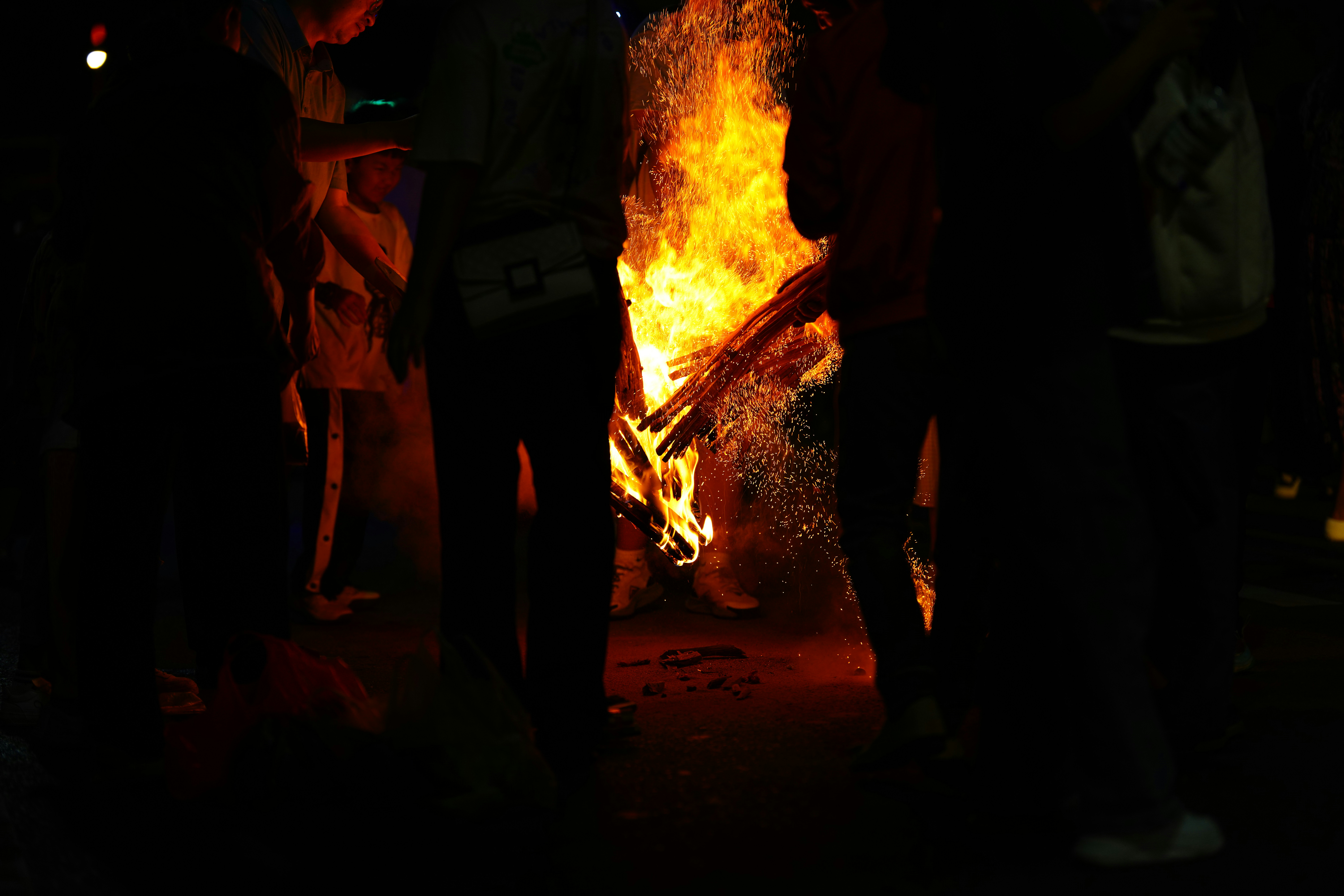 EmbersBeyond: Midnight Bonfire Under Murky Crowd
