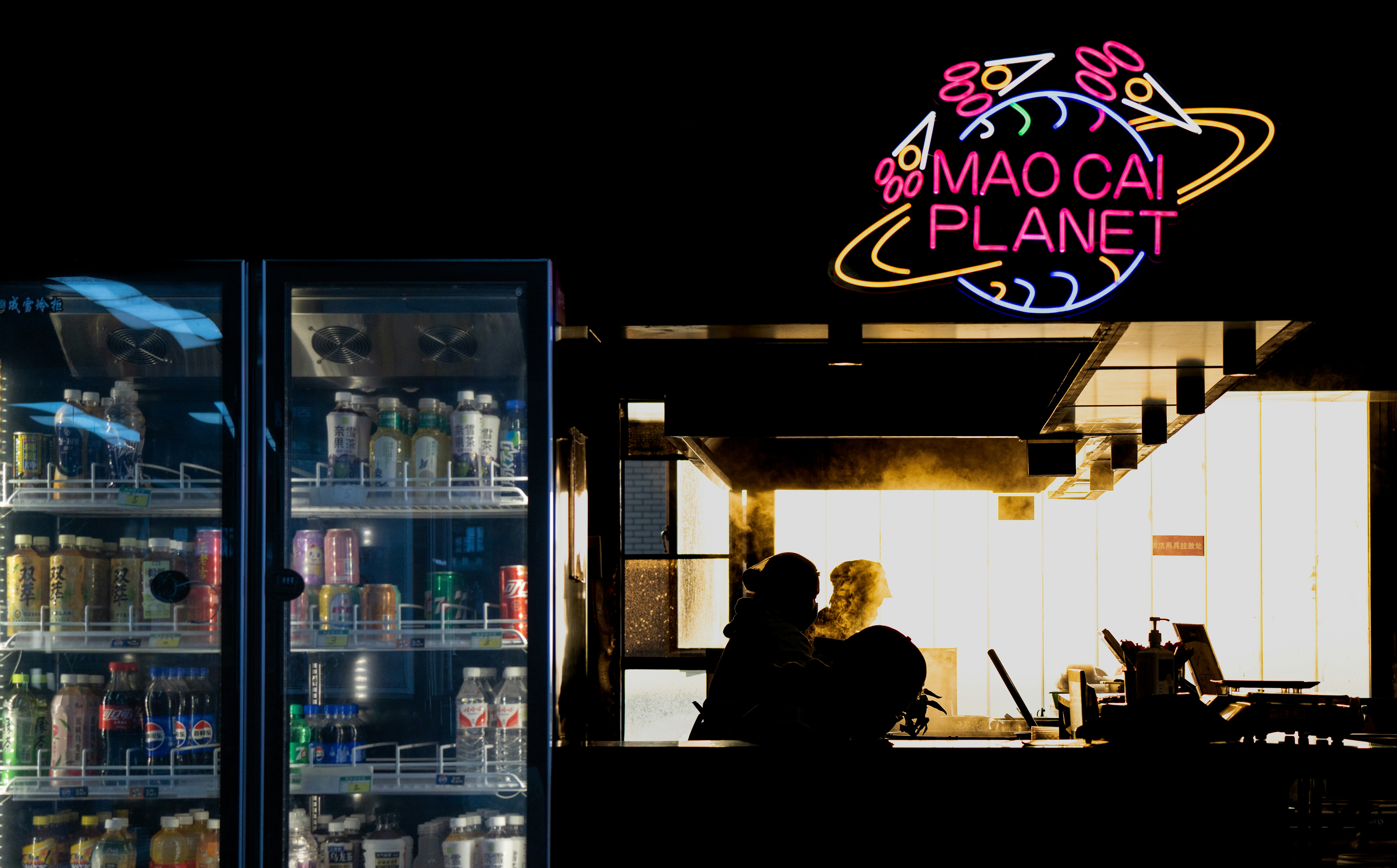 Neon Sign, Silhouettes, and a Quiet Café at Dusk