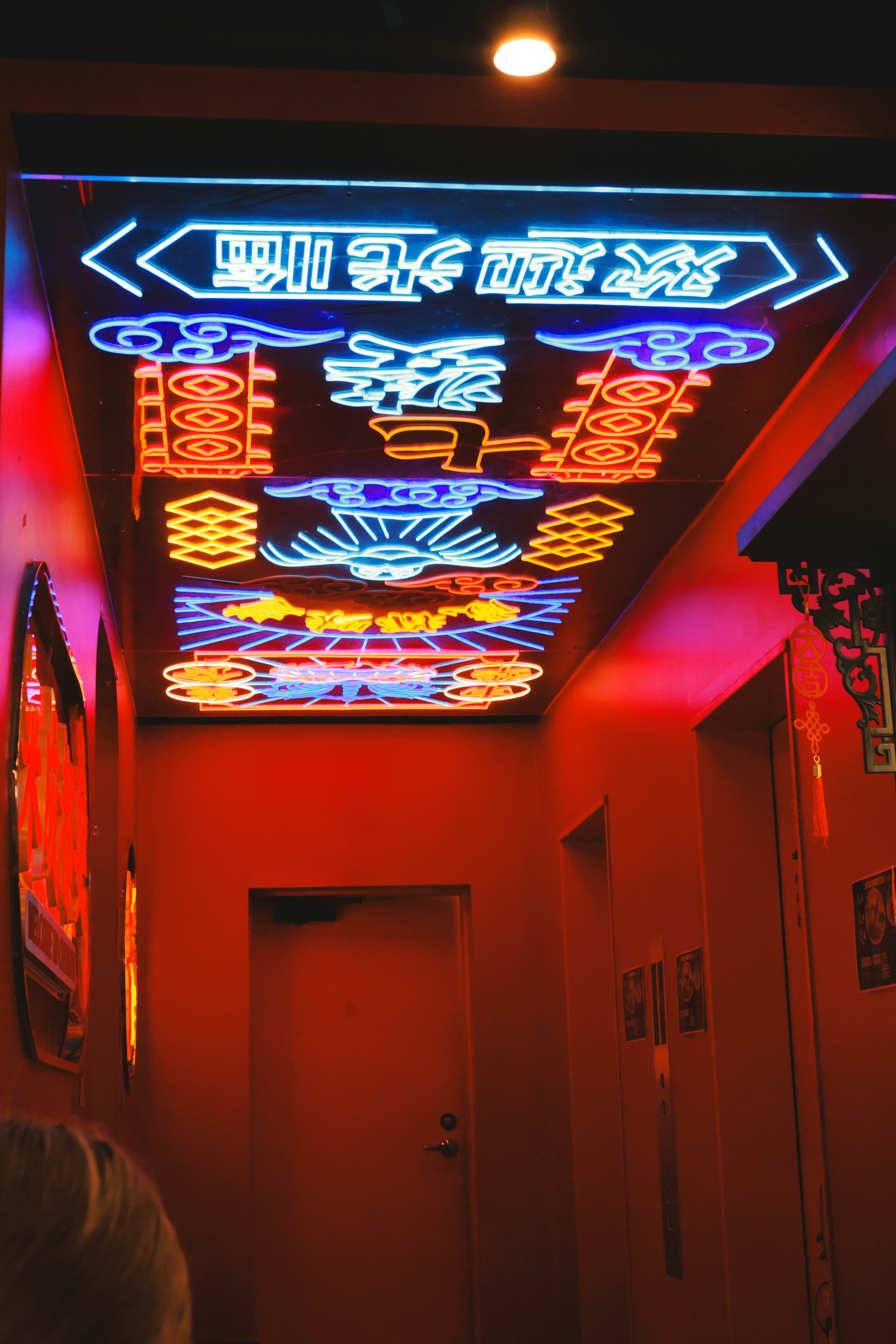 Neon Corridor: Guiding Lights of a Red-Hued Hall