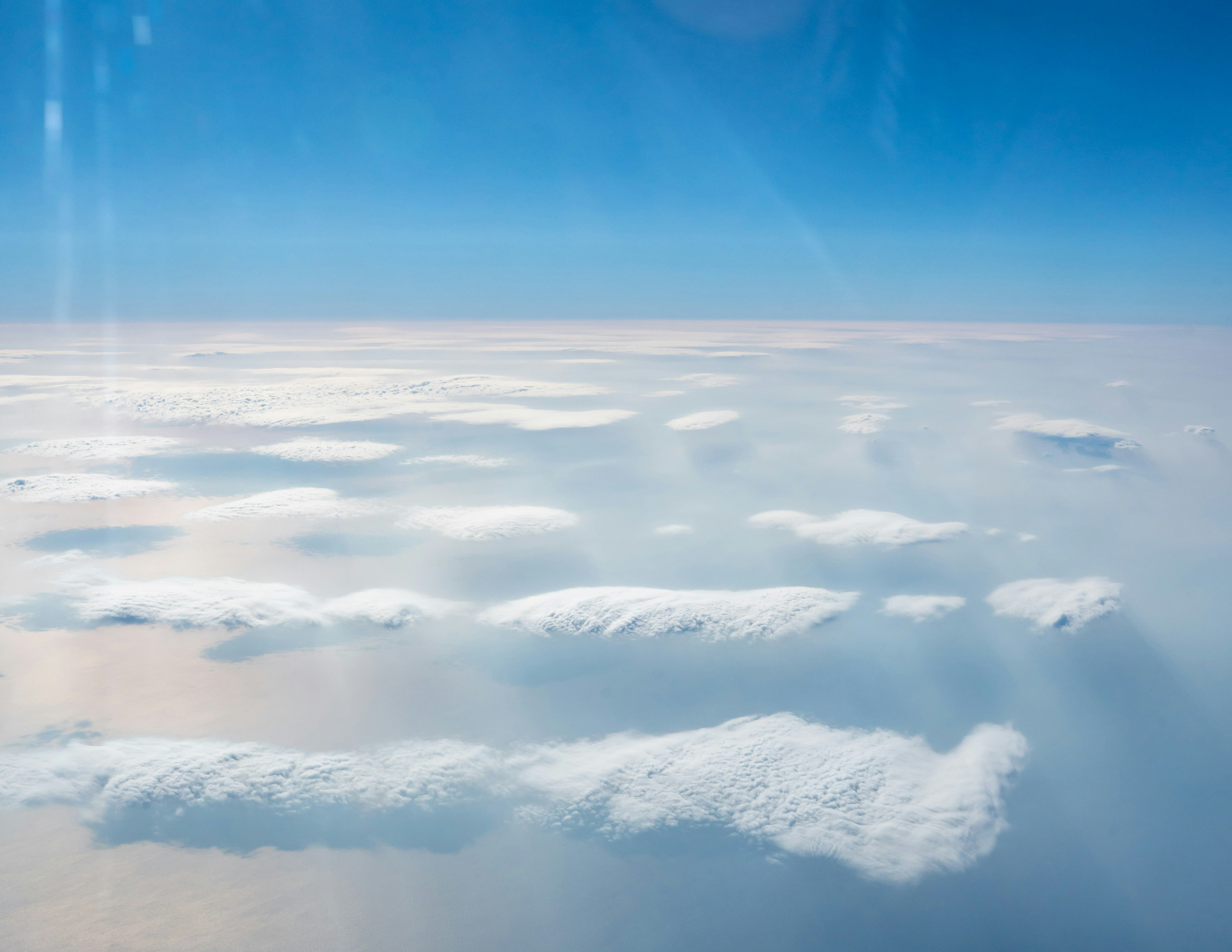 Above the White Ocean: A Skyward Sea of Clouds