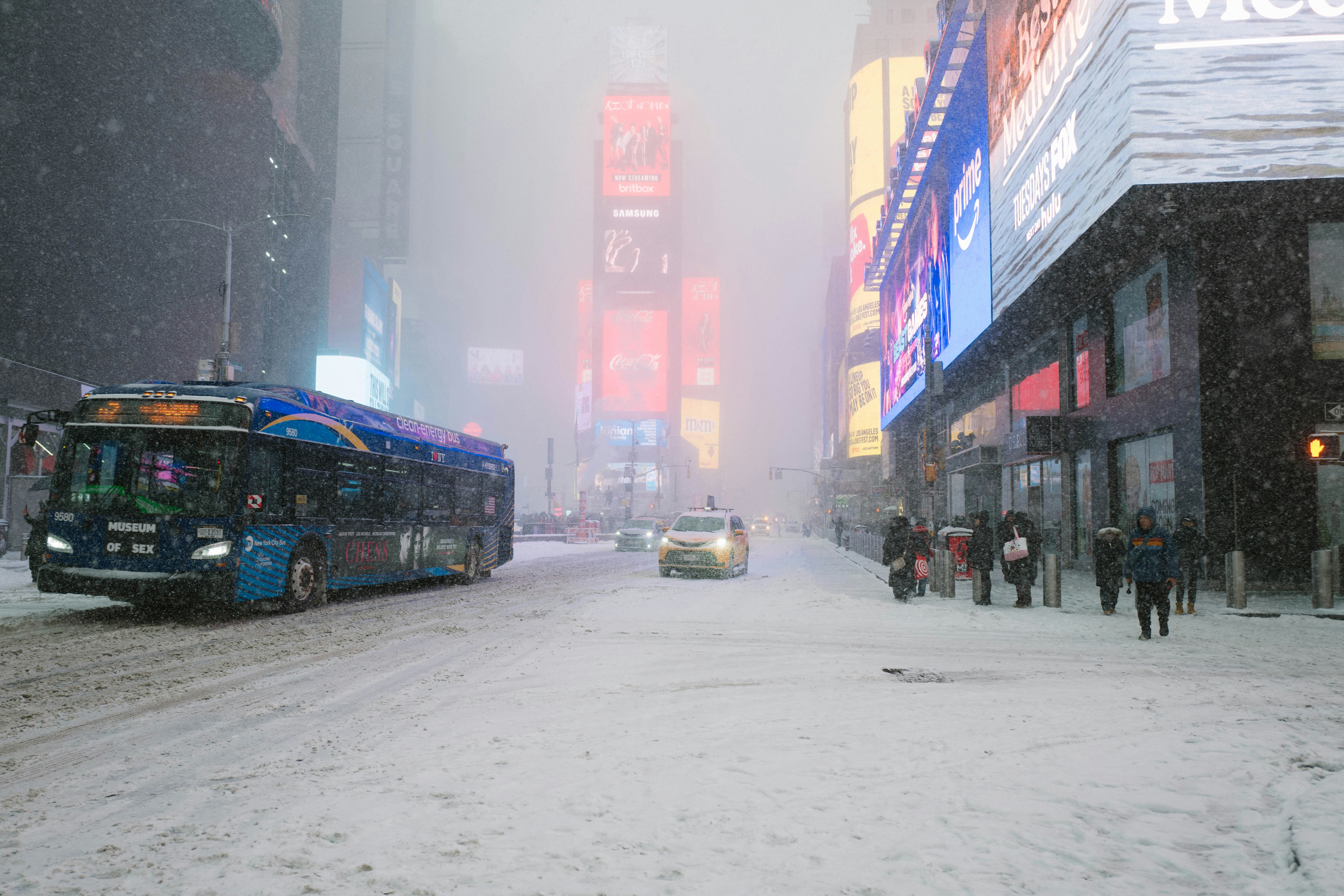 Snow-blanketed Times Square: A Quiet Witness in the Blizzard