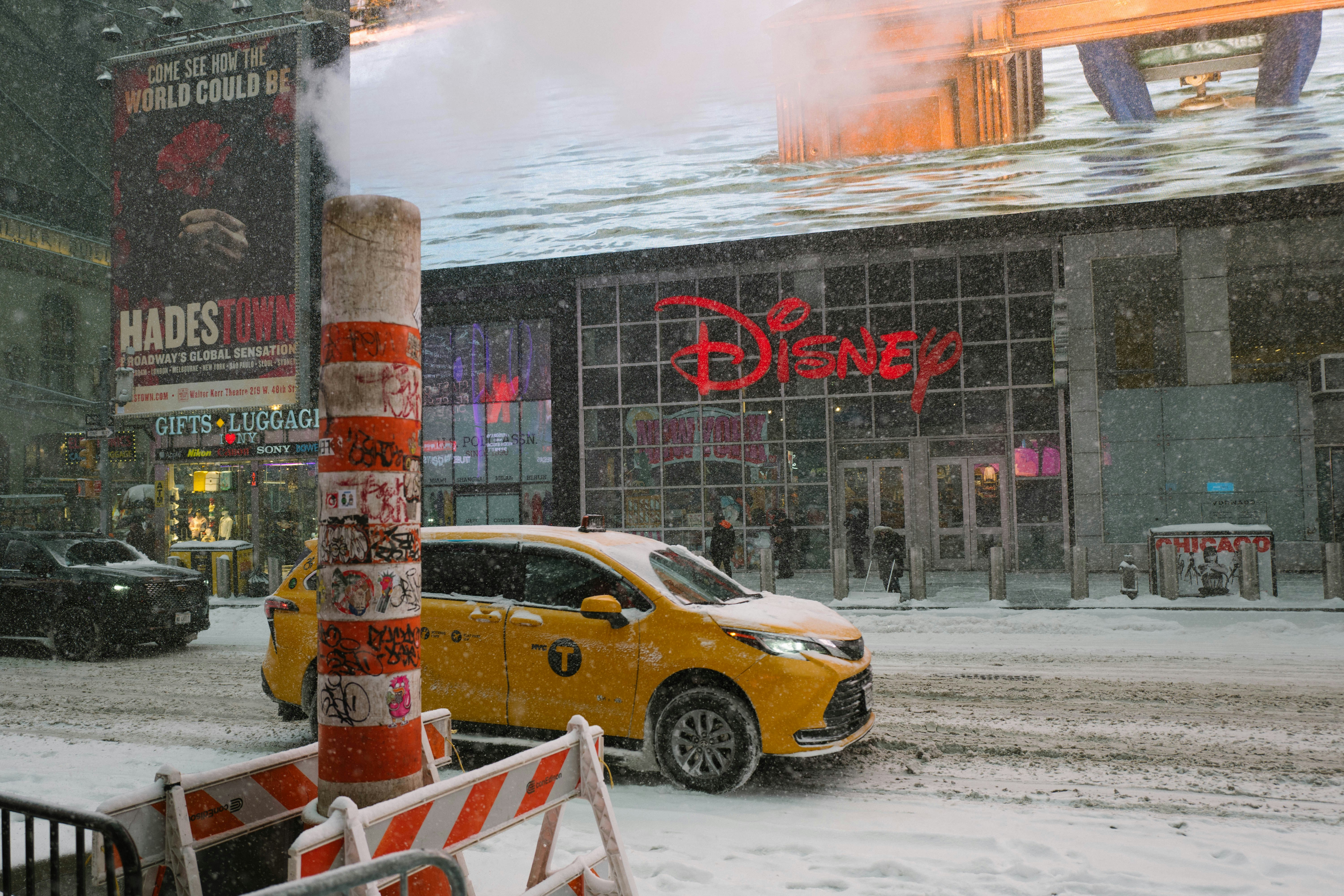 Yellow Taxi in Snowfall at Disney Store Threshold