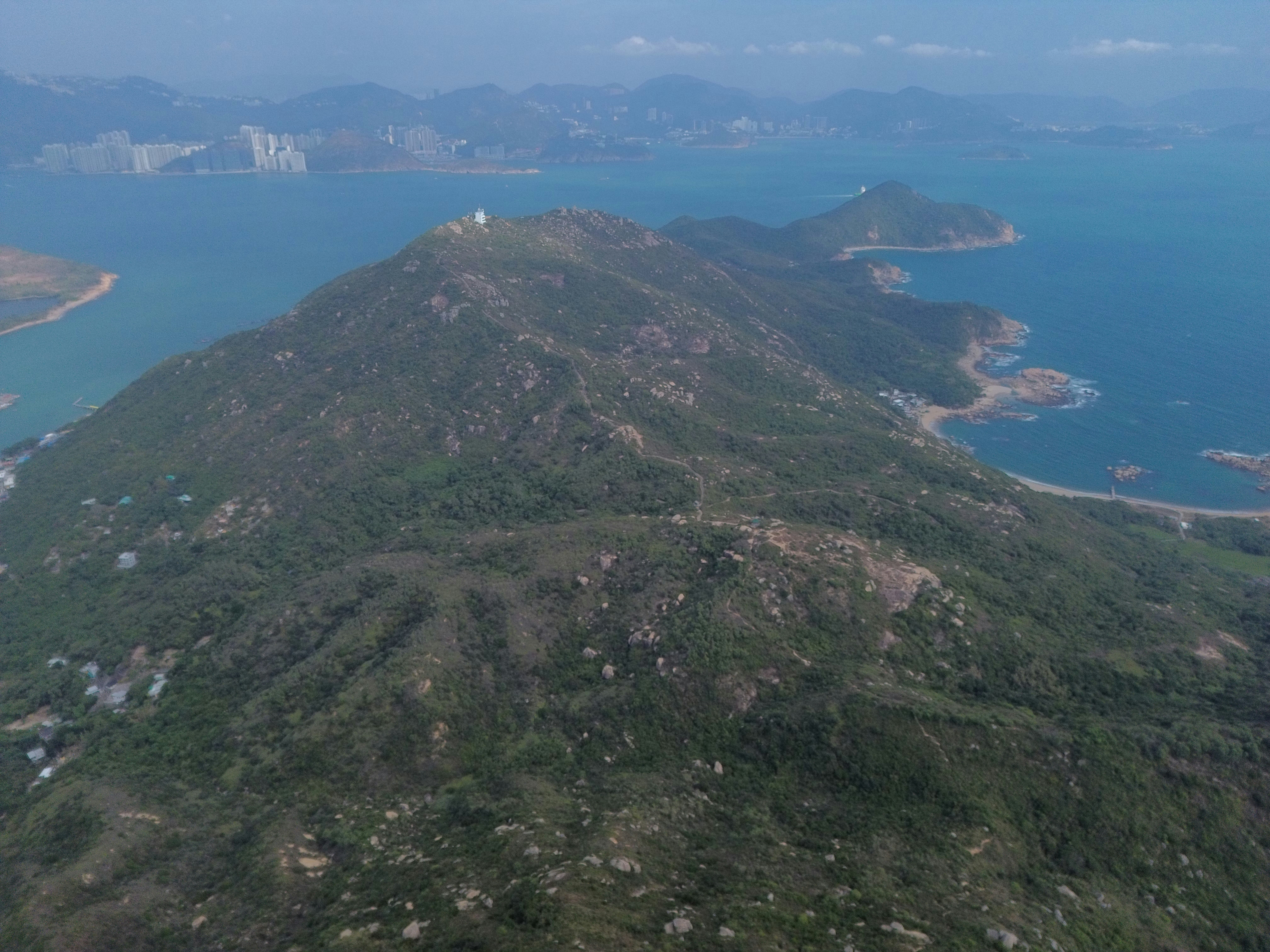 Ridge Over Ocean: Aerial View from Coastal Highlands