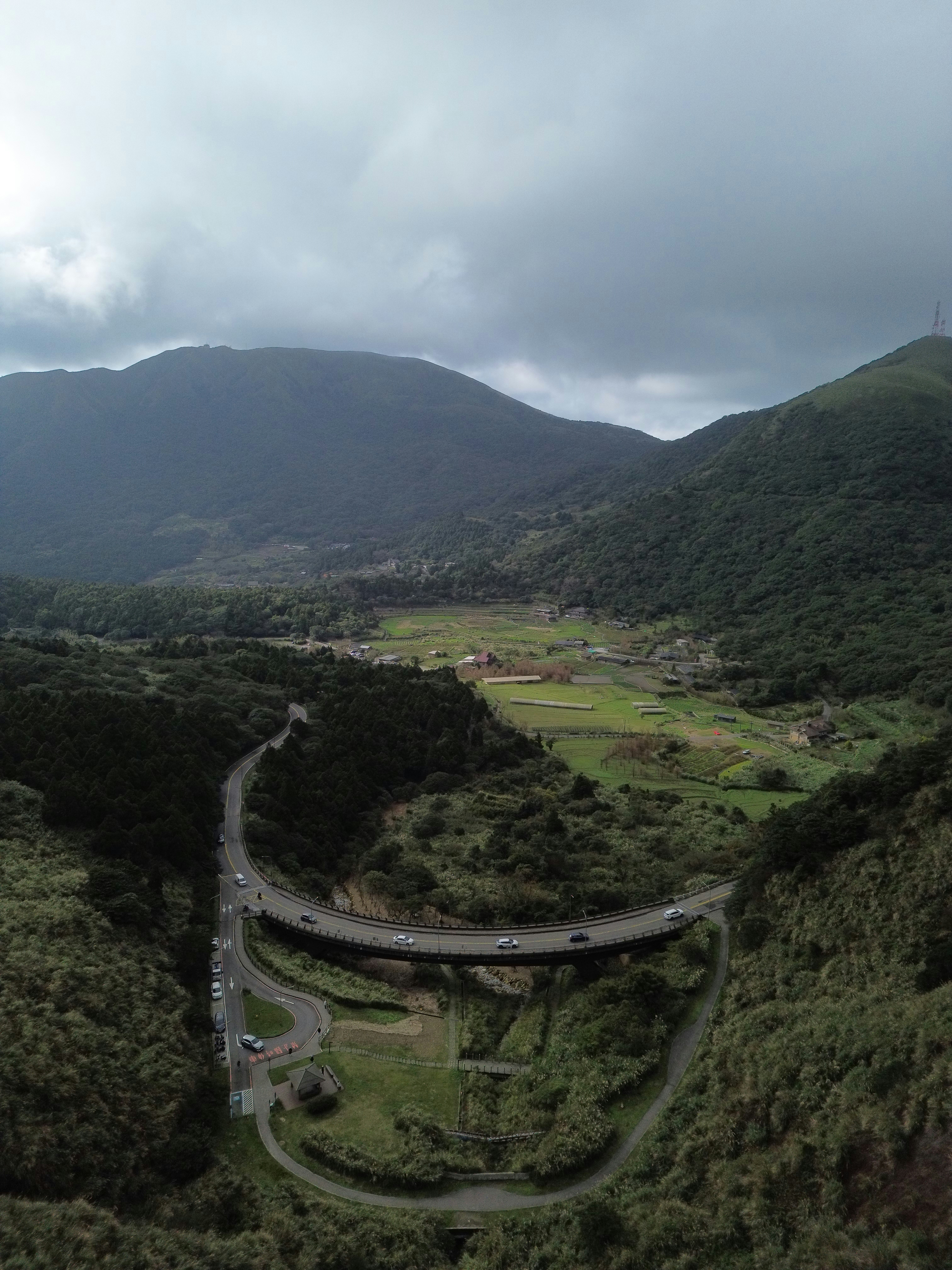 Serpentine Bridge WSR: A Valley Road Winding Through Green Hills