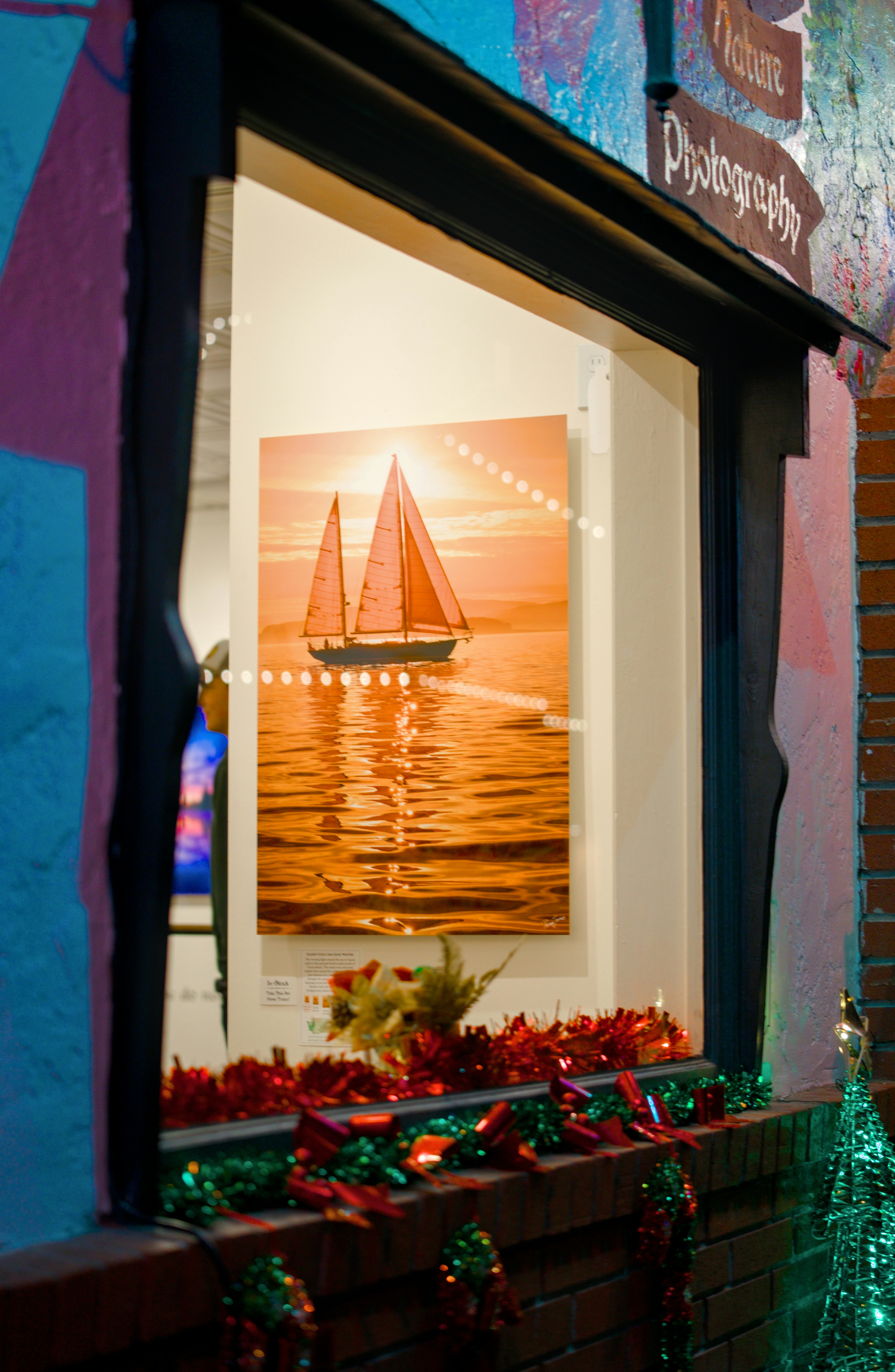 Sailboats Through a Window of Holiday Light