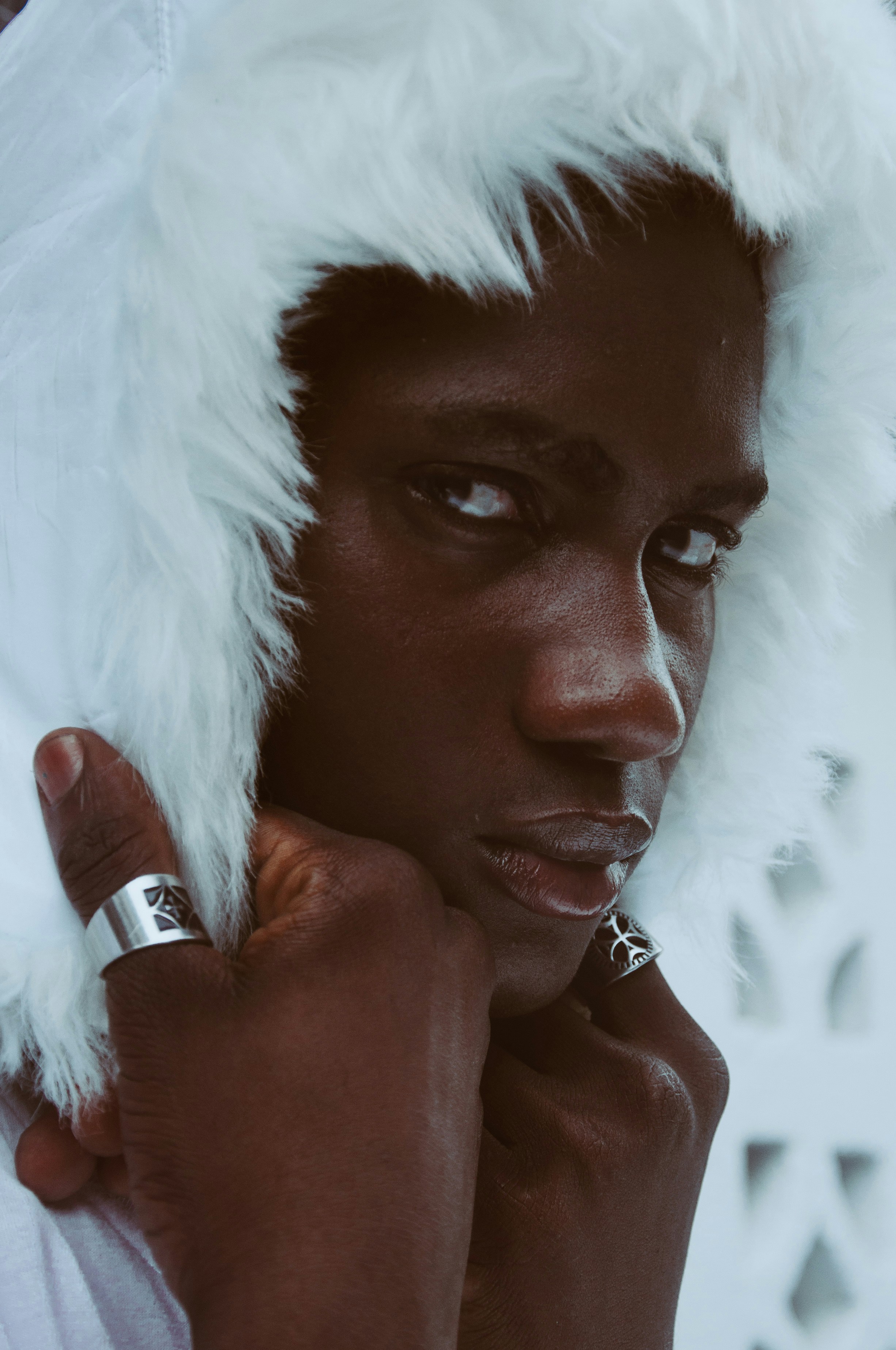 Ice-Hidden Gaze: Portrait Under White Hood