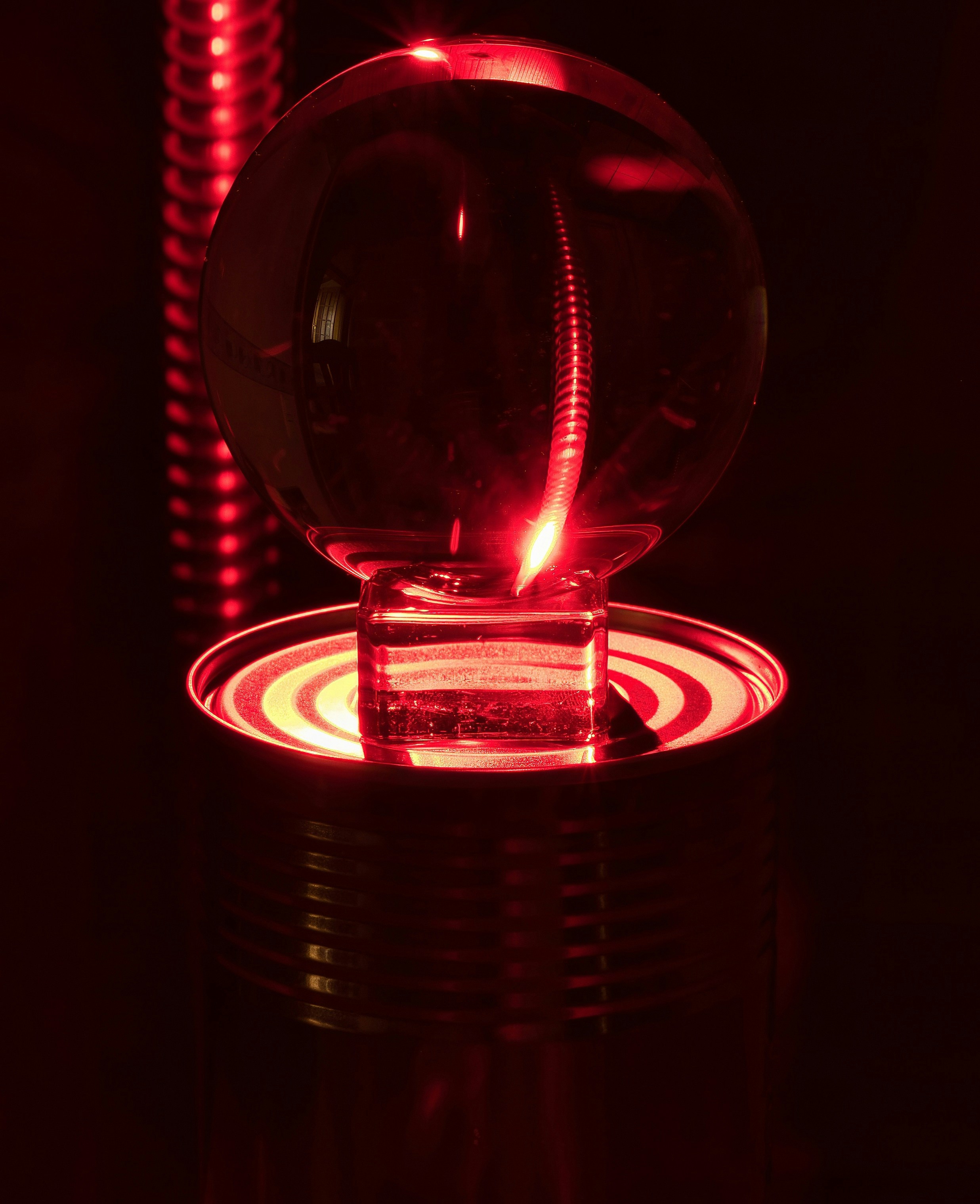 Crimson Orb over a Neon-etched Base