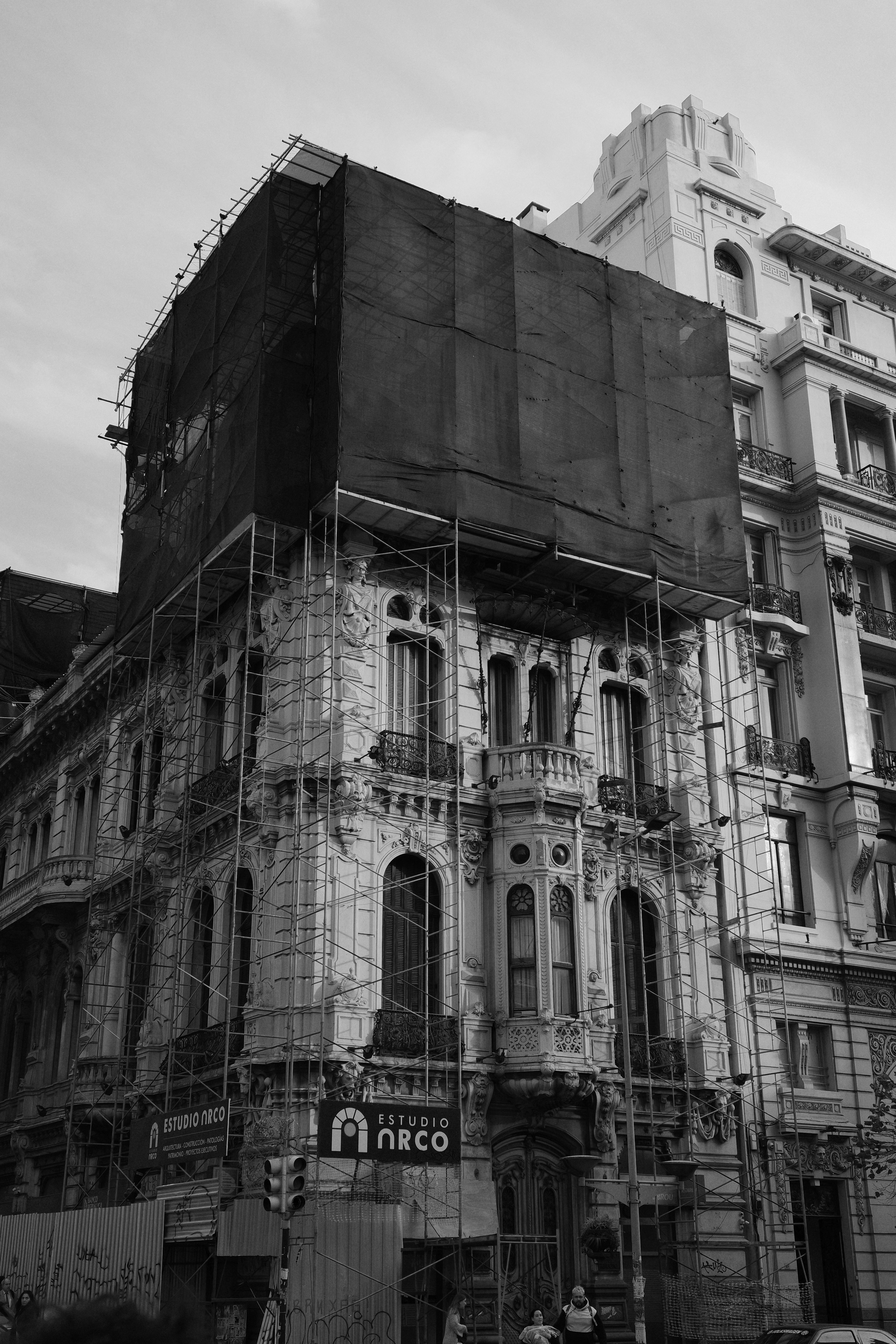 Facade Under Construction: A Historic Corner Wrapped in Scaffolding
