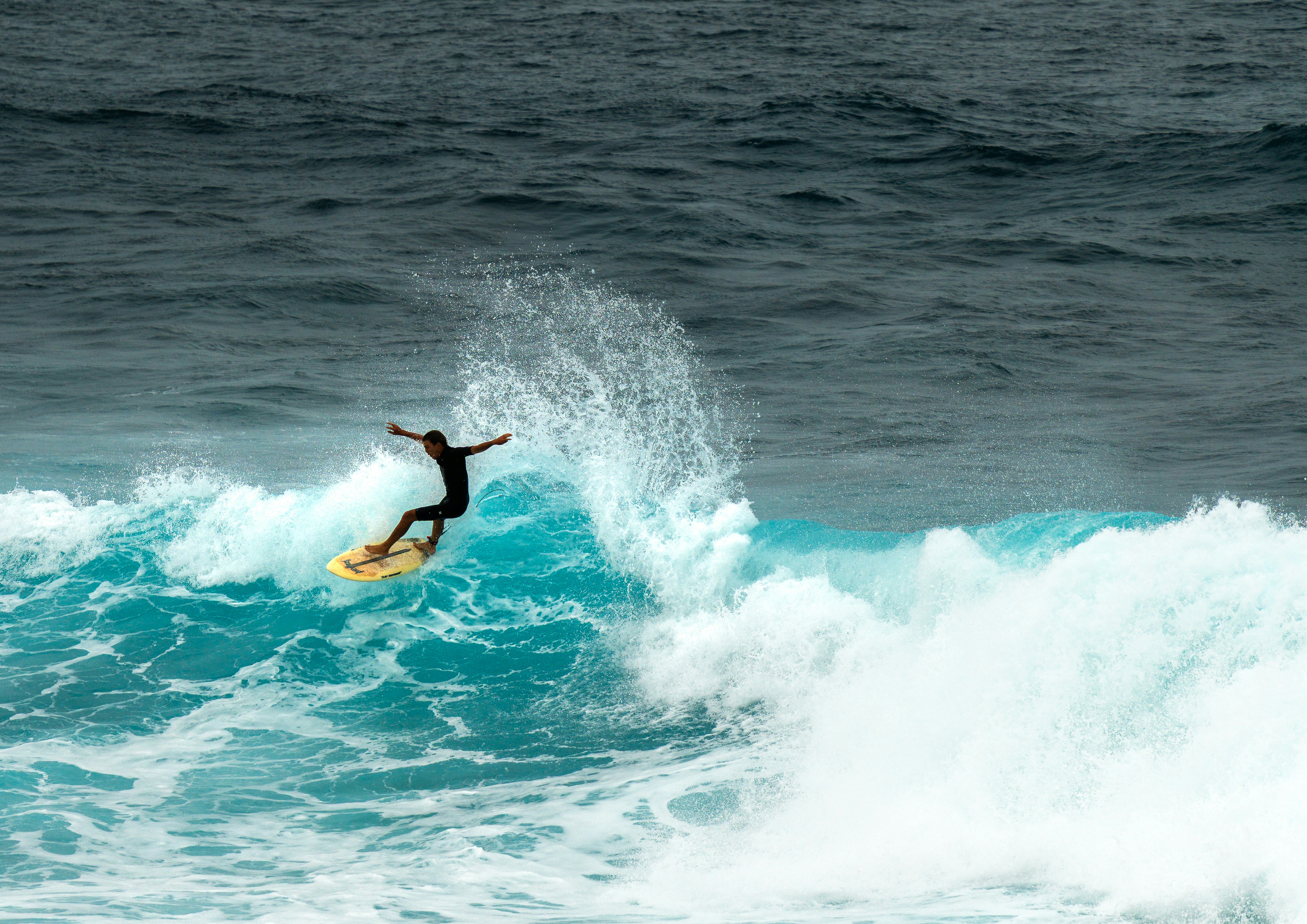 Rider in Flight: A Surfing Crest Halting the Wave