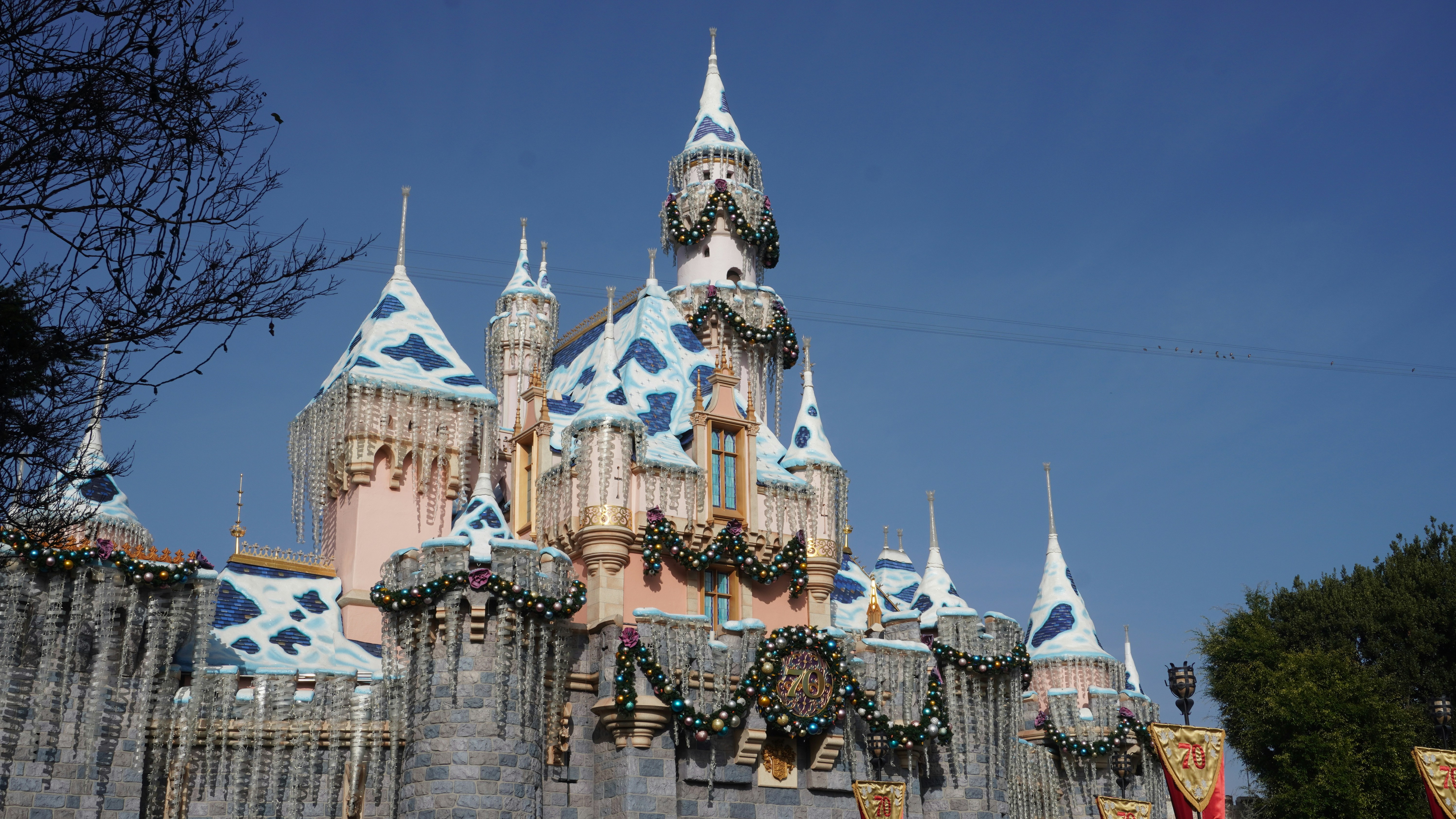 Castle Crest: Festive Towers Dusted with Snow and Lights