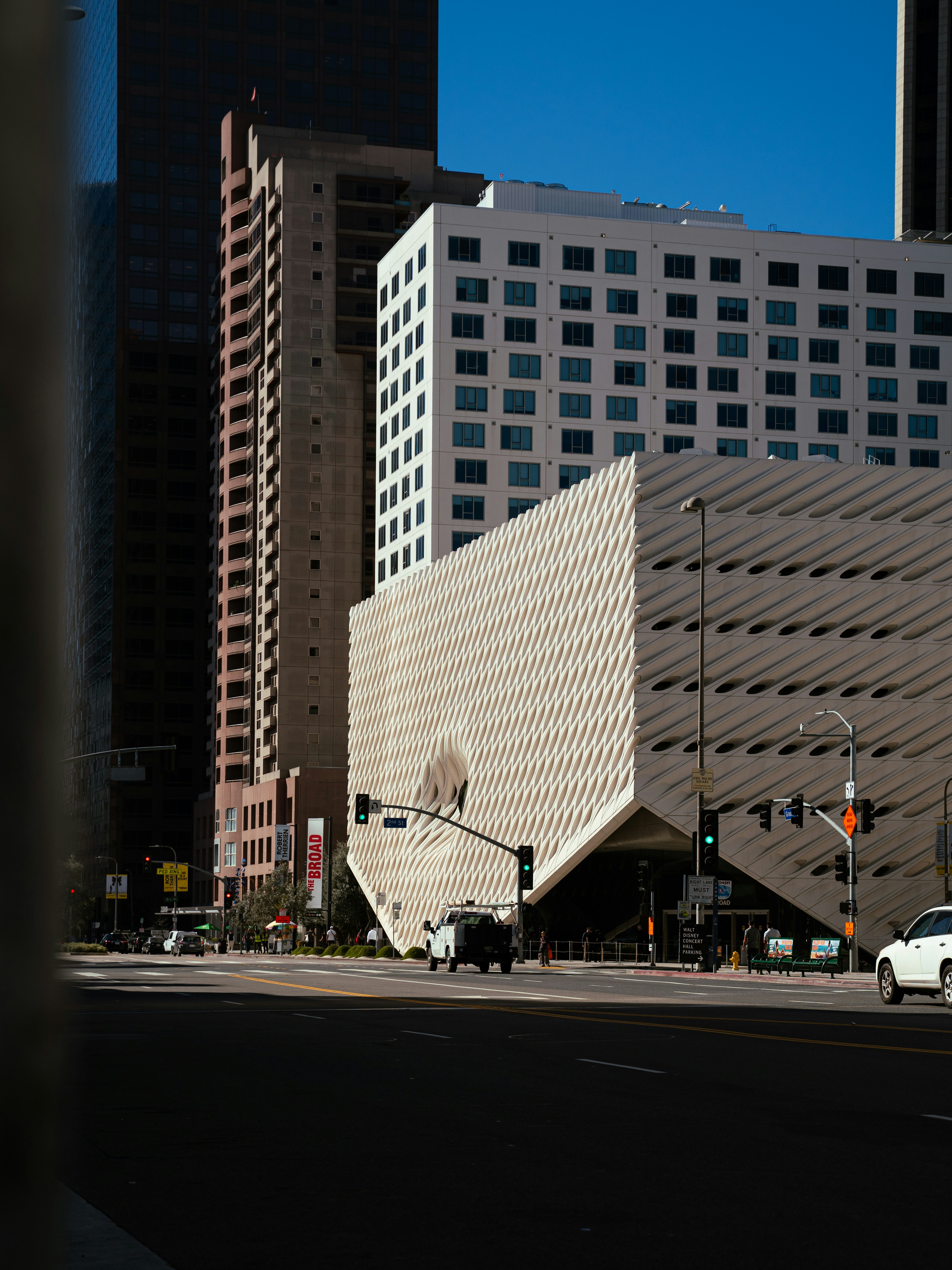 Urban Architectural Ballet: The Faceted Facade that Shapes the Street