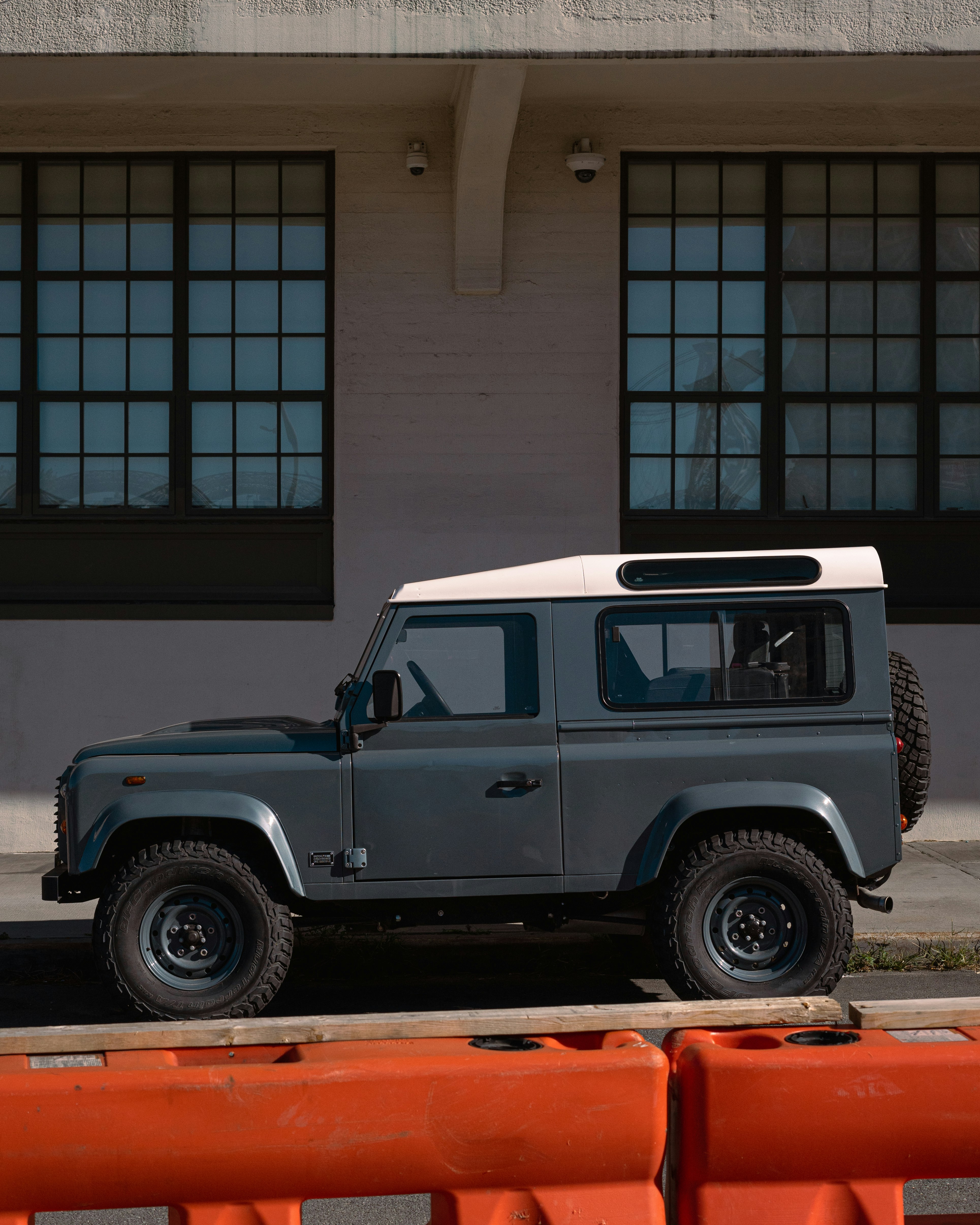 Classic blue Land Rover by the Loading Dock