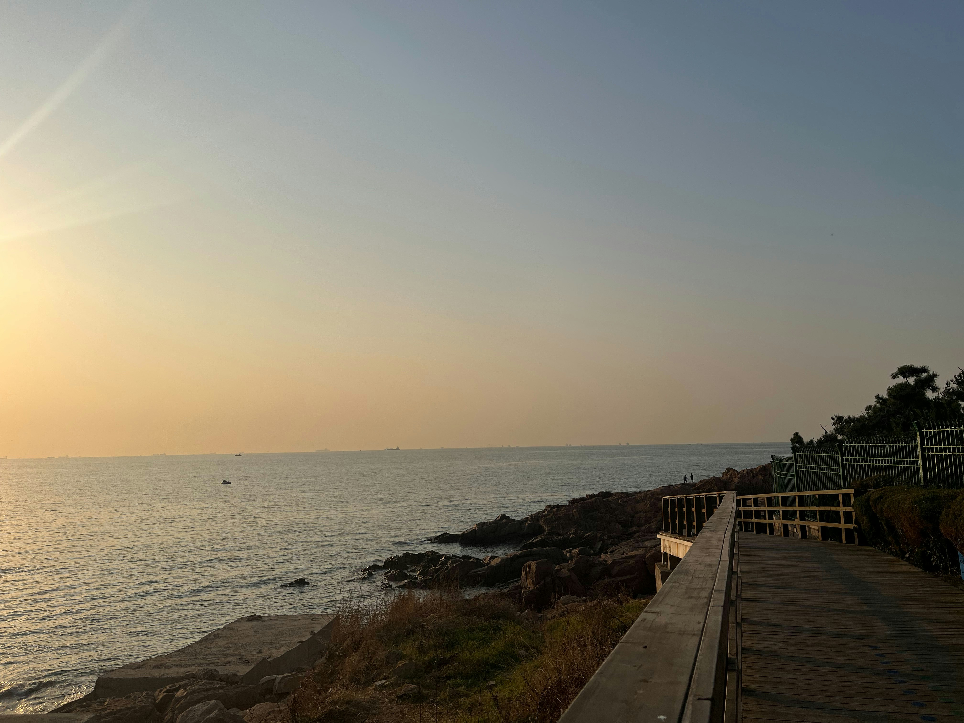 Sunlit Promenade by the Quiet Sea