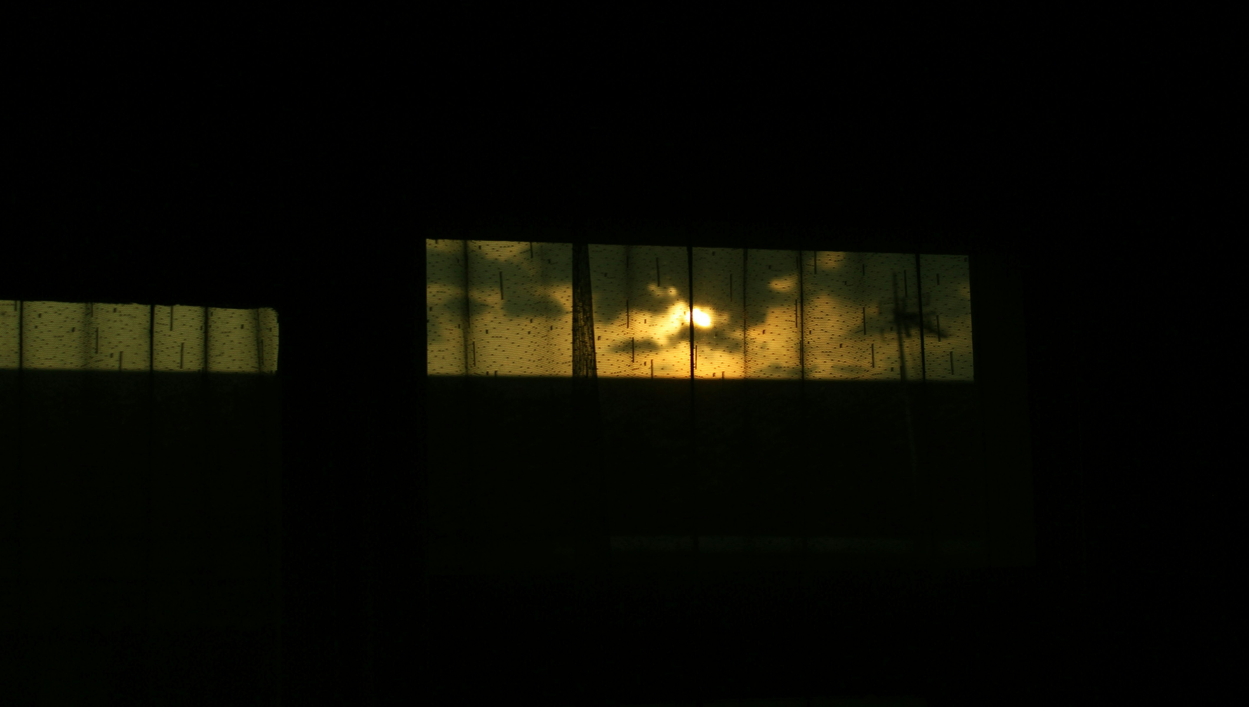 Sunlit Breakthrough Through a Narrow Window