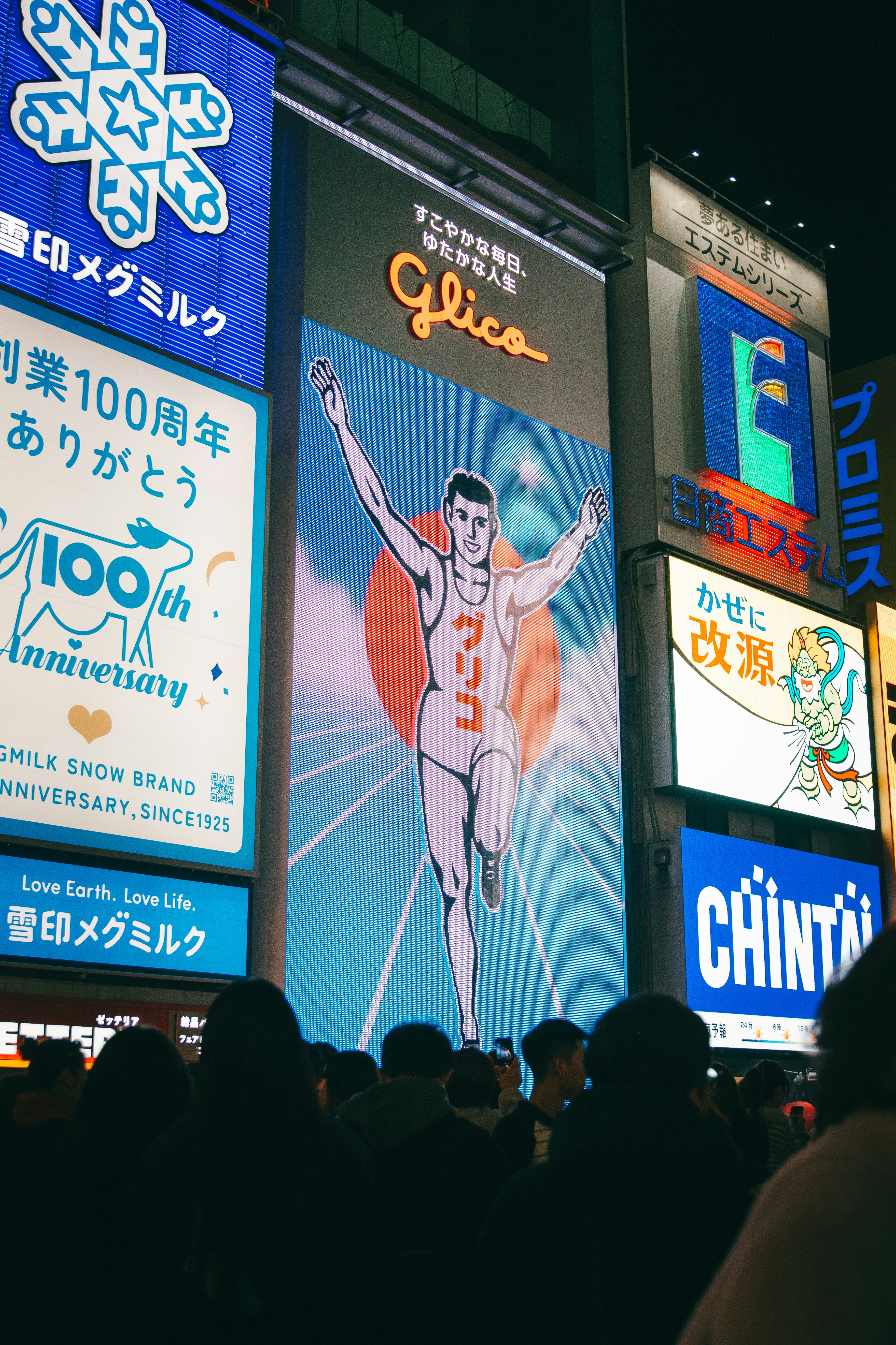 Luminous Neon Pulse: A Heroic Pose Amid Tokyo’s Time-Square Lights