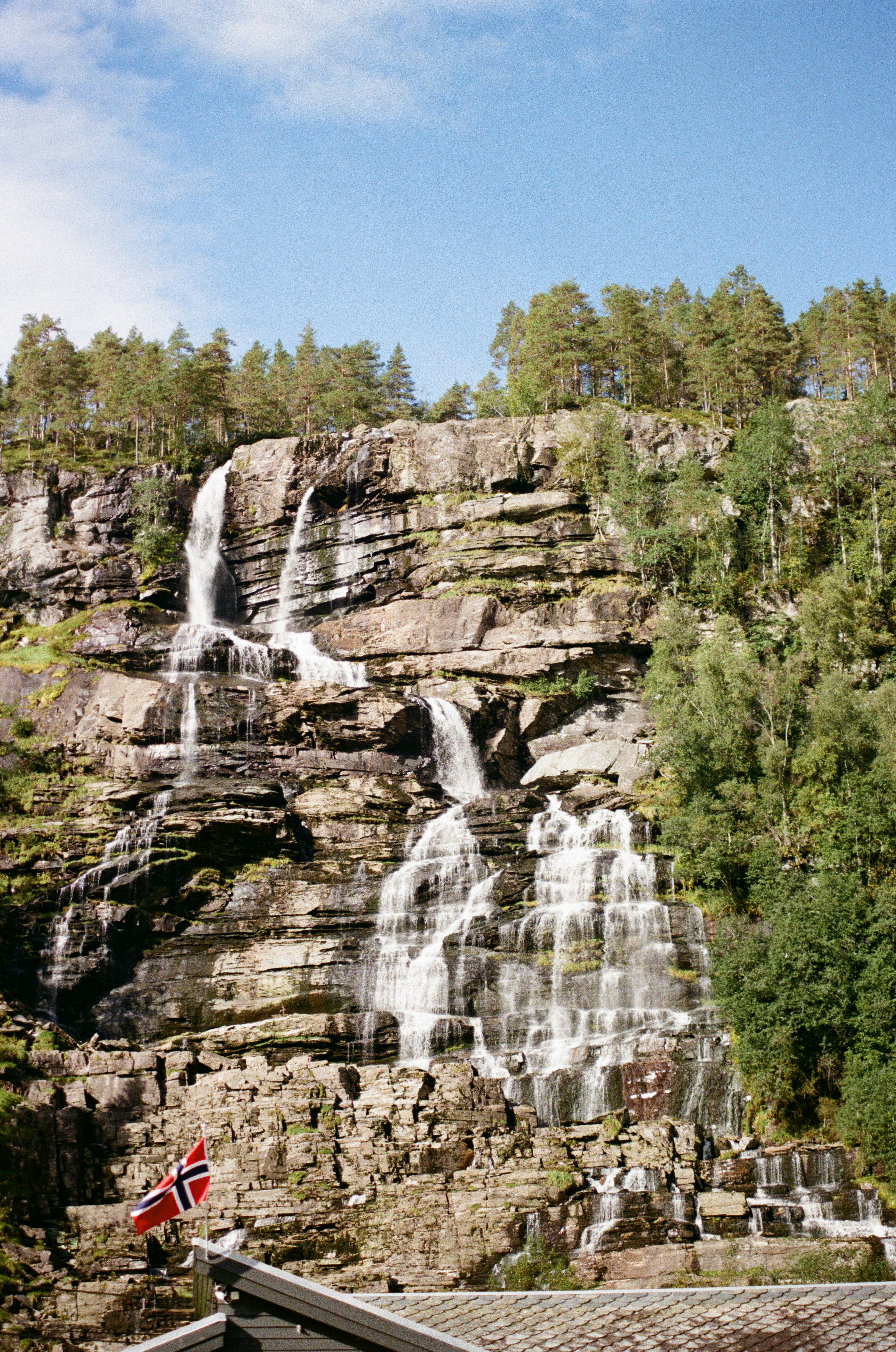 Norwegian Falls Overlook: Cascade Beside the Flag at Dappled Light