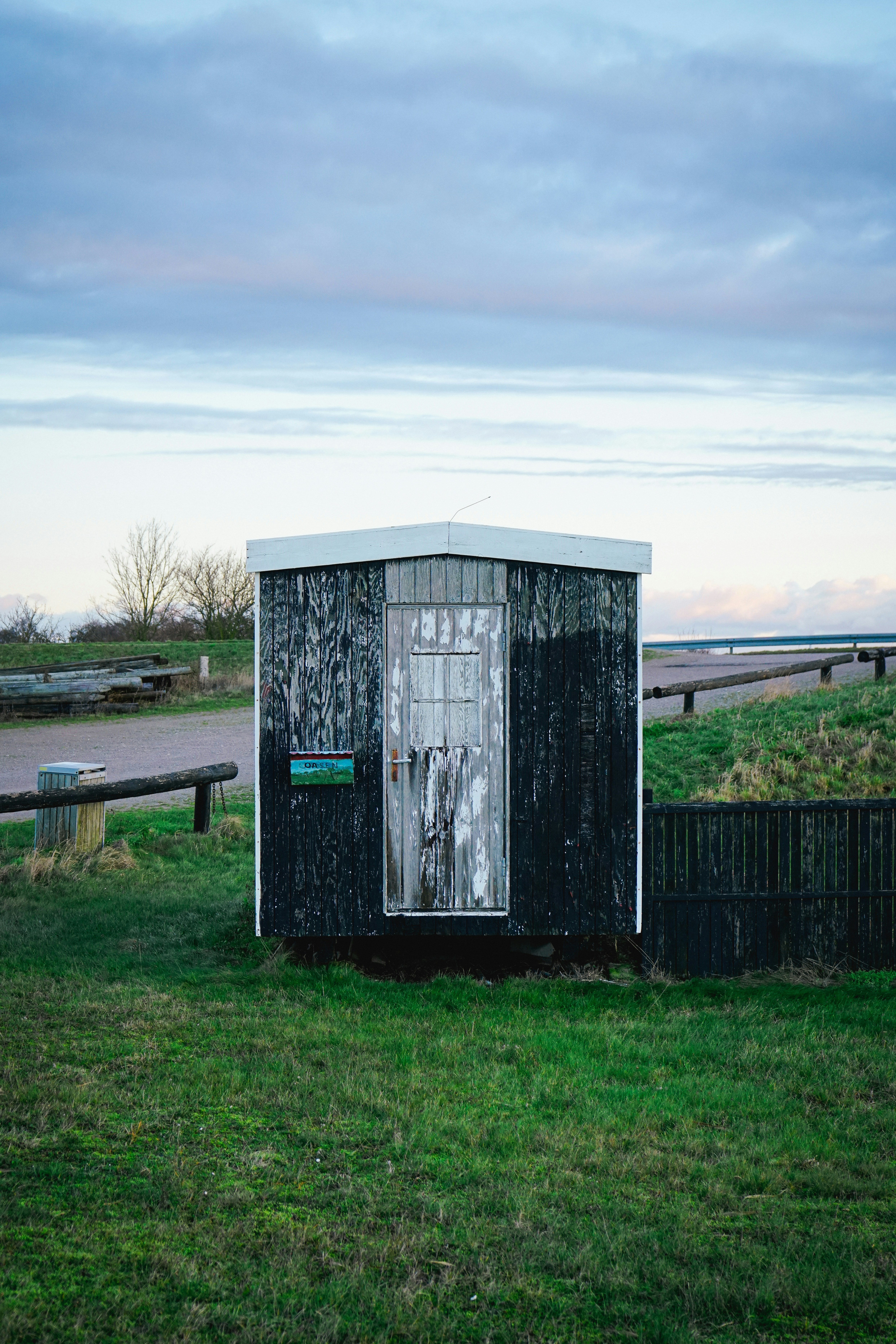 Weathered Outbuilding by the Rails