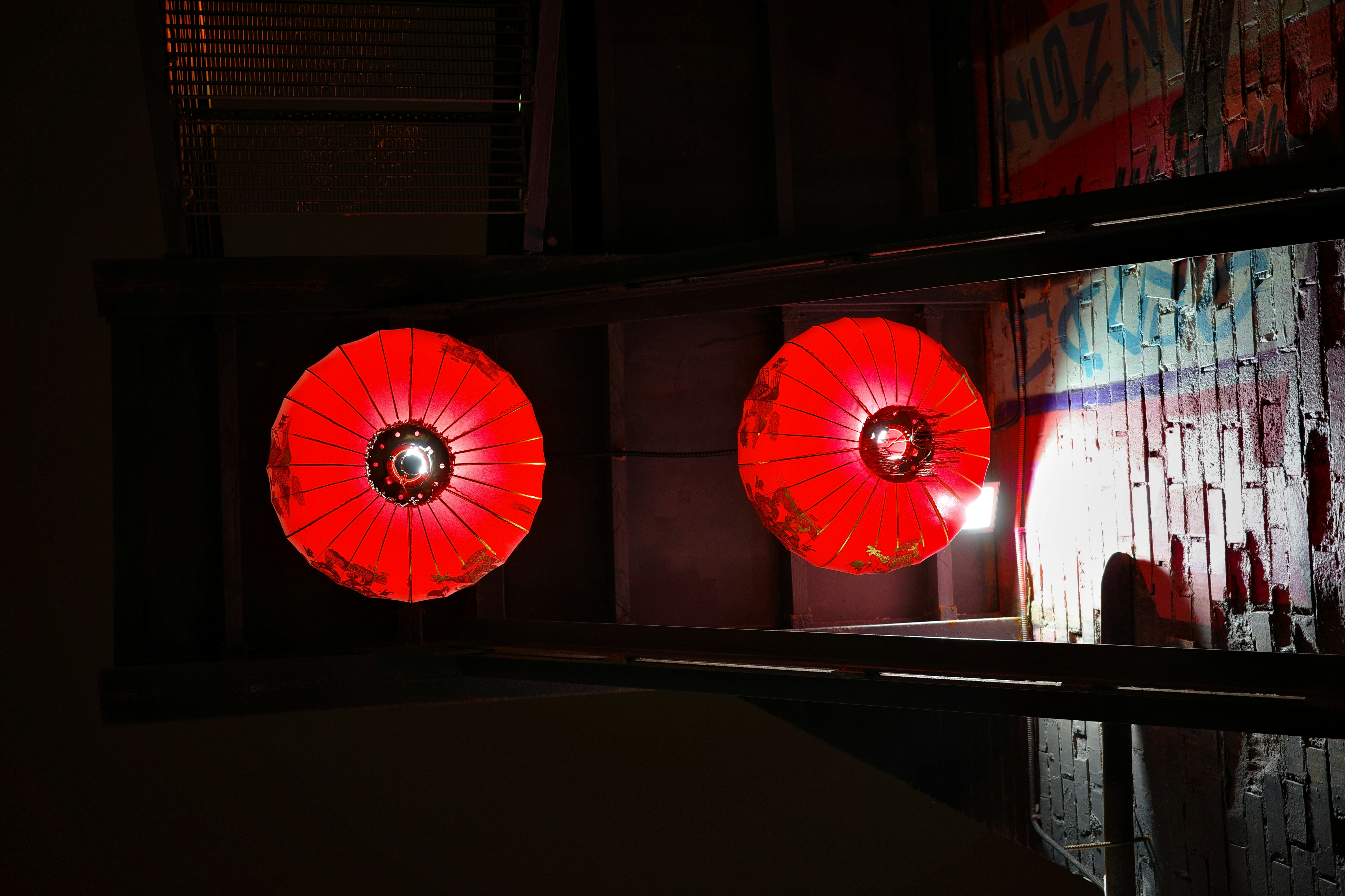 Red Lanterns in a Dim Alley: Neon Glow on Rough Concrete