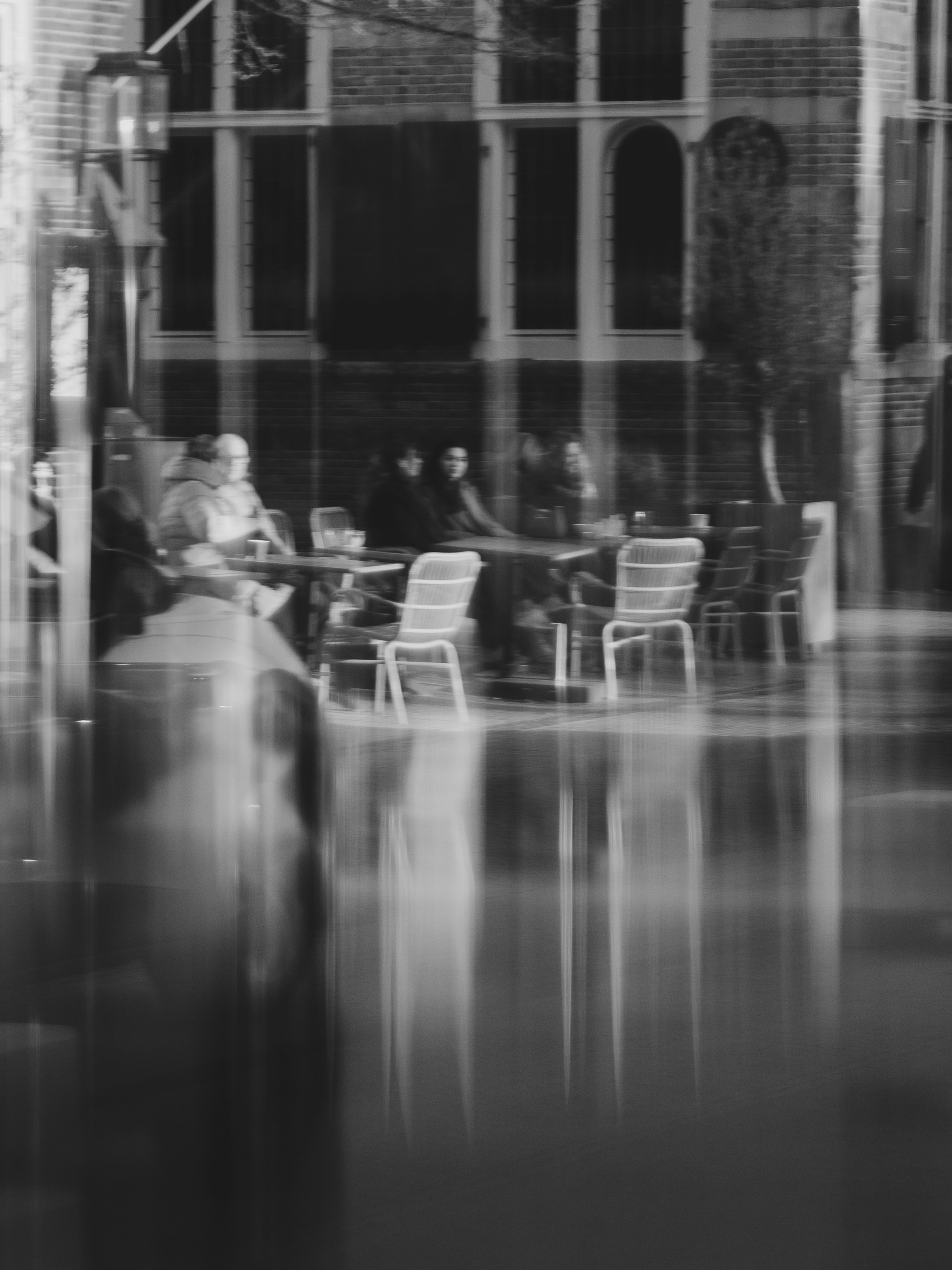 Cafe Shadows: Ghosts at the Table in a City Afternoon