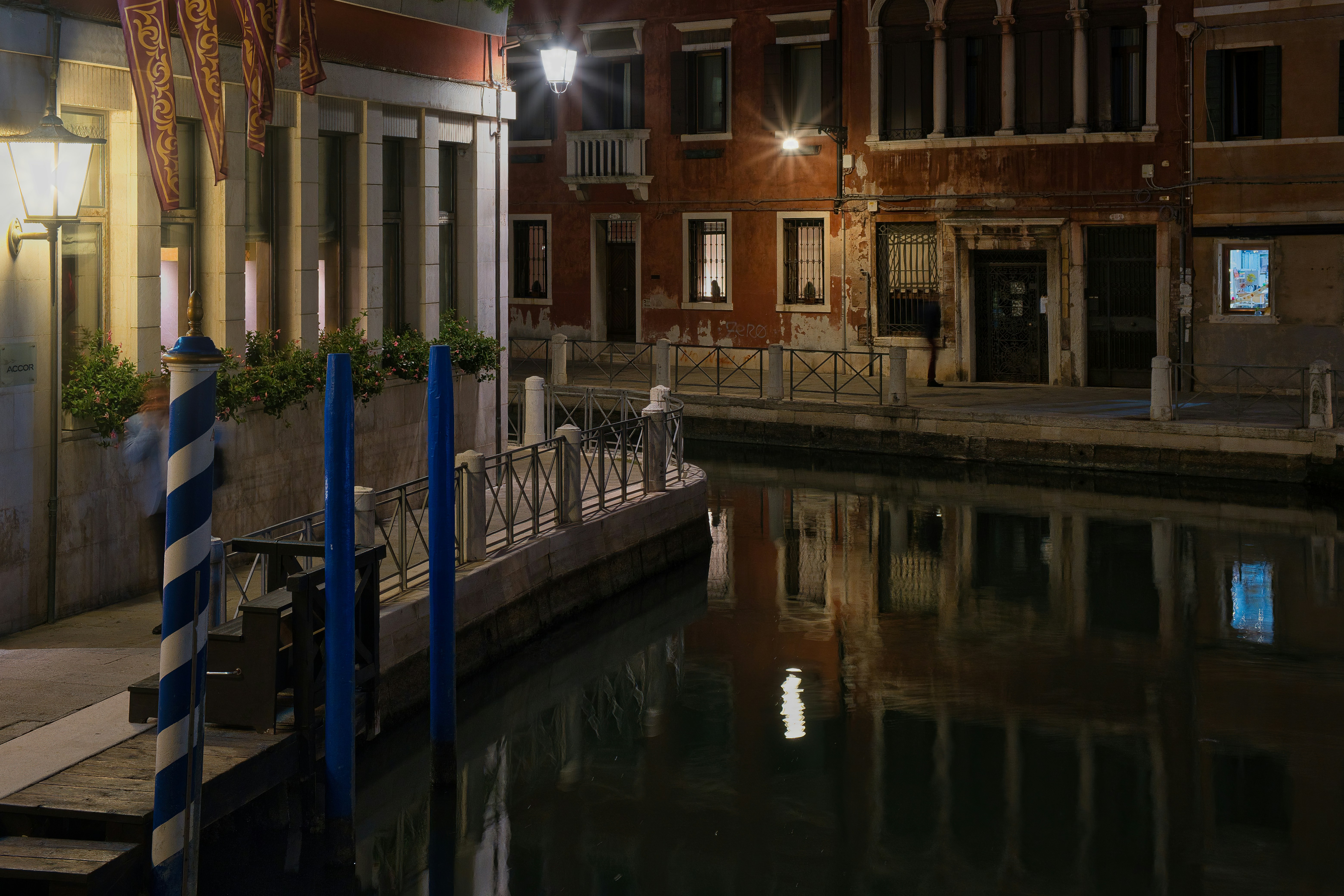 Quiet Canal at Nightfall in a Venetian-Style Quarter