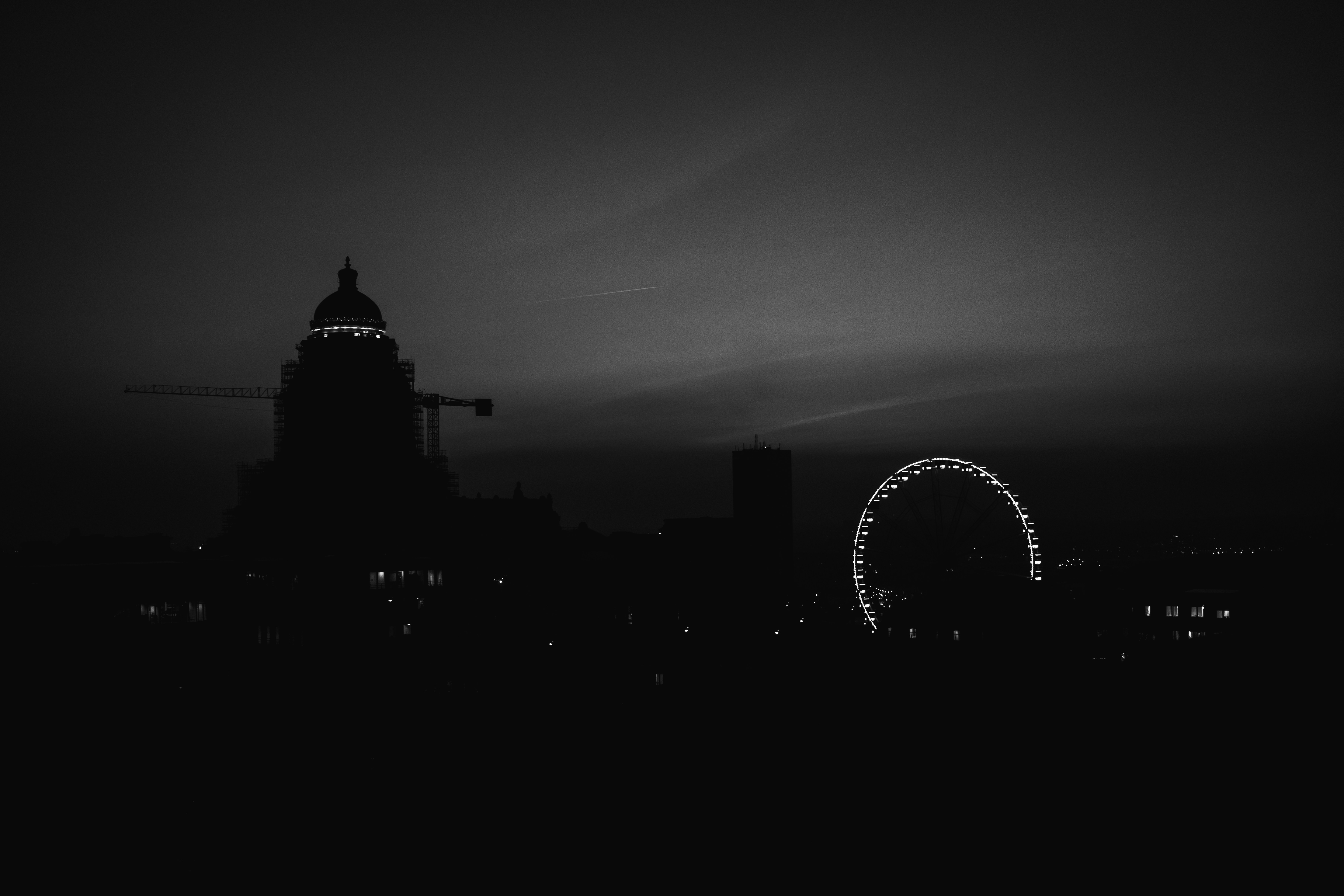 Night Skyline: A Crescent of Light Over a Silent City