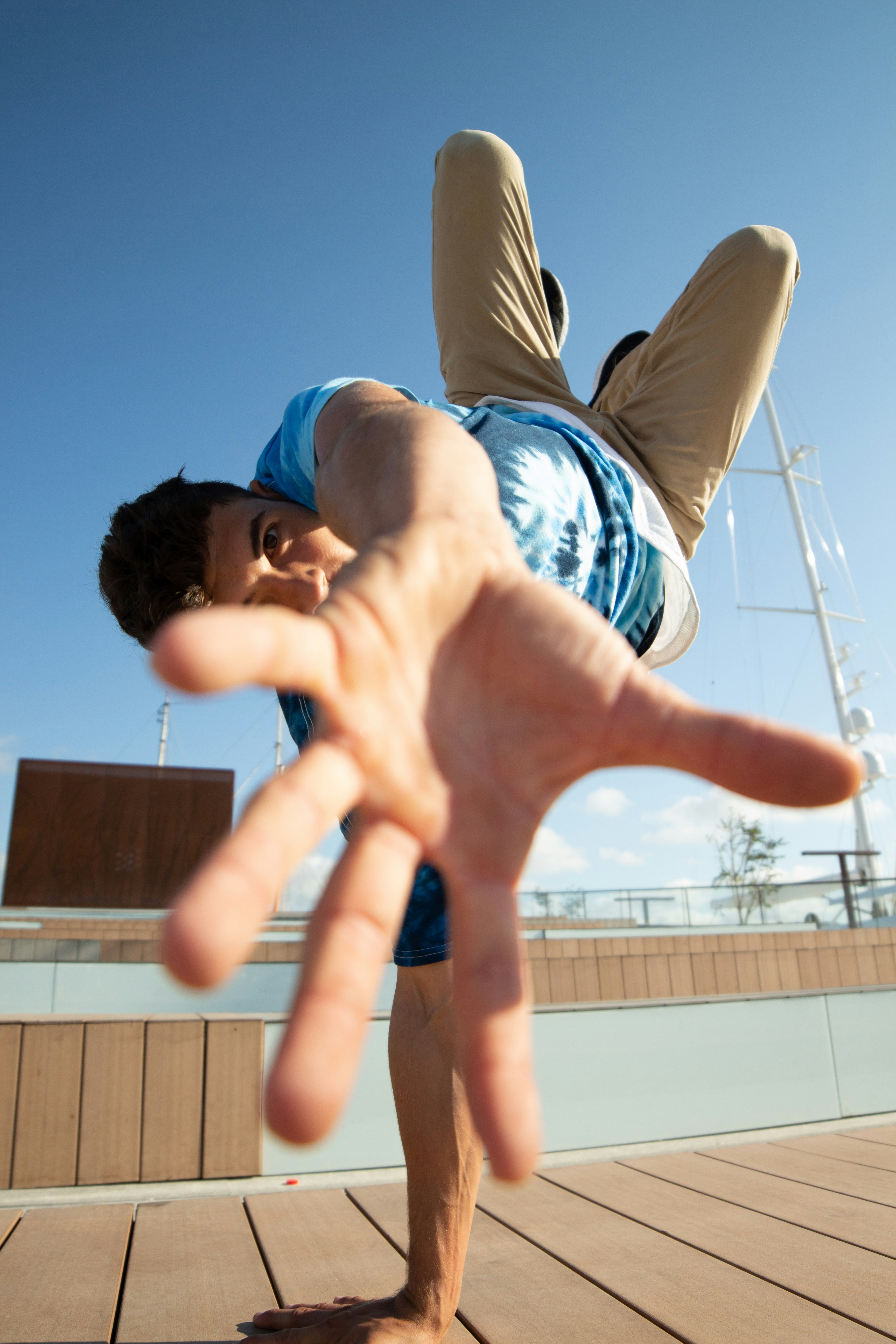 Reach for the Sky: A Dynamic Kickflip of Light and Shadow