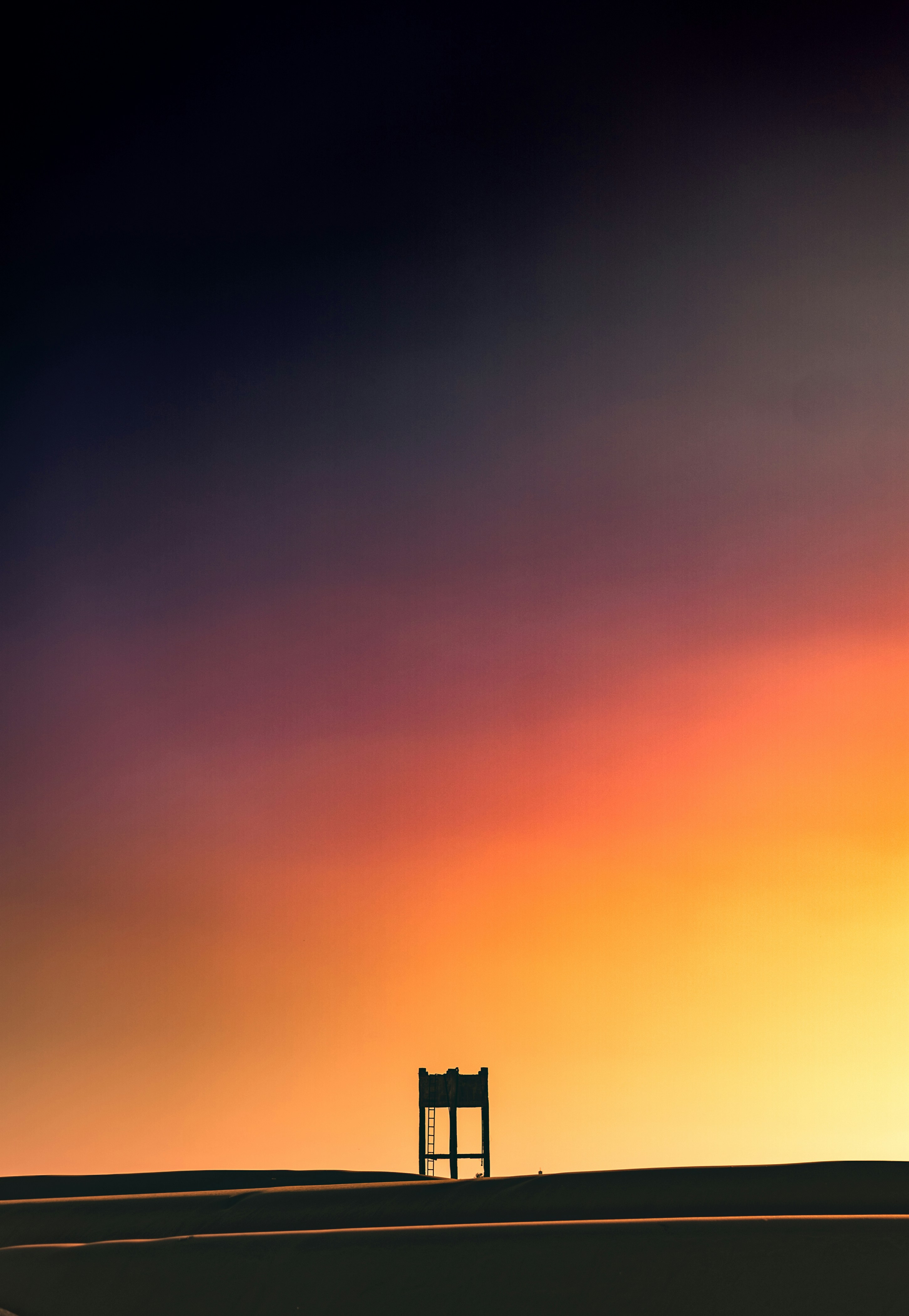 Solitary Fencechair at the Horizon of Twilight
