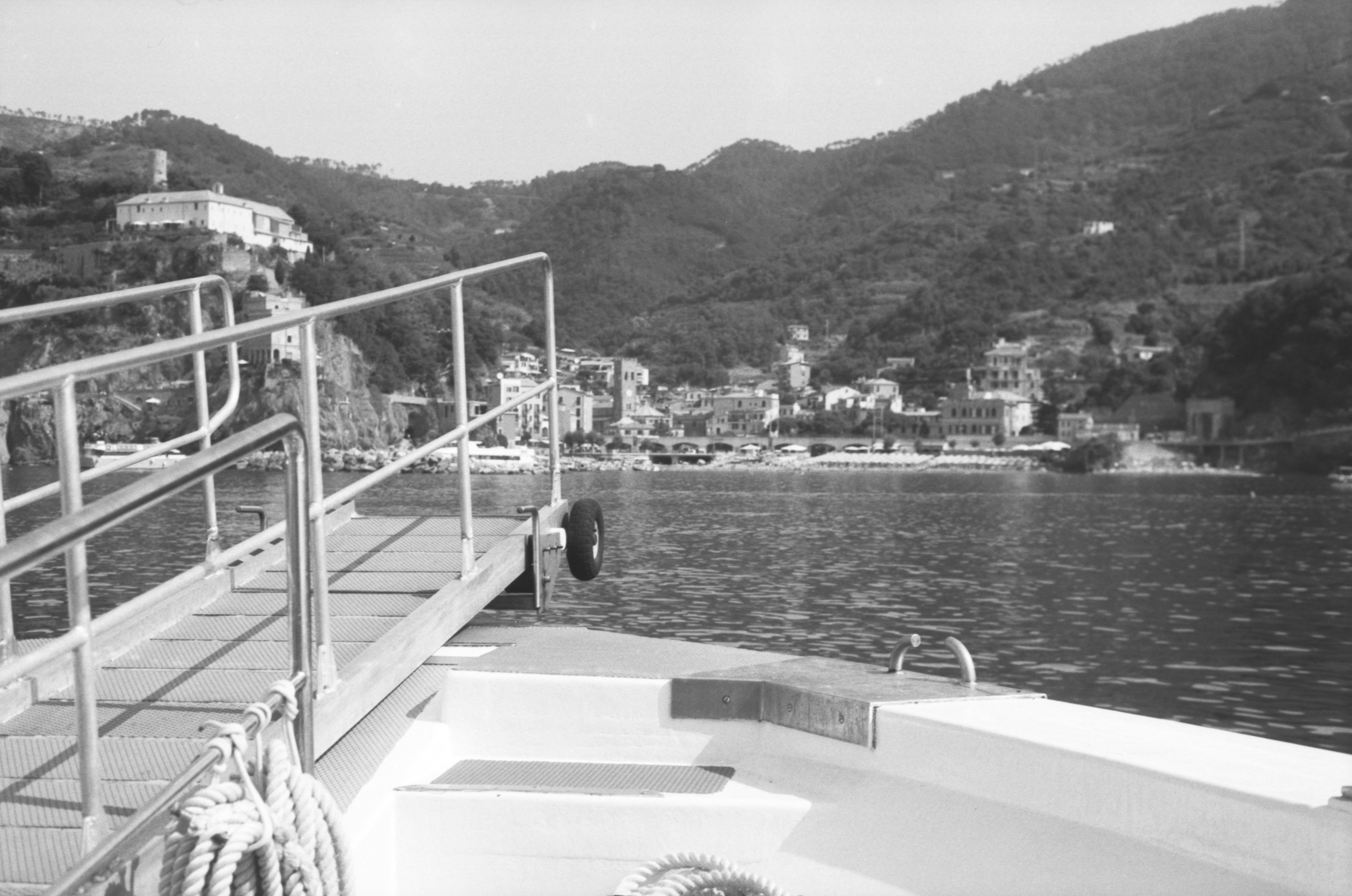Harbor View from the Deck: Coastal Town and Distant Hills