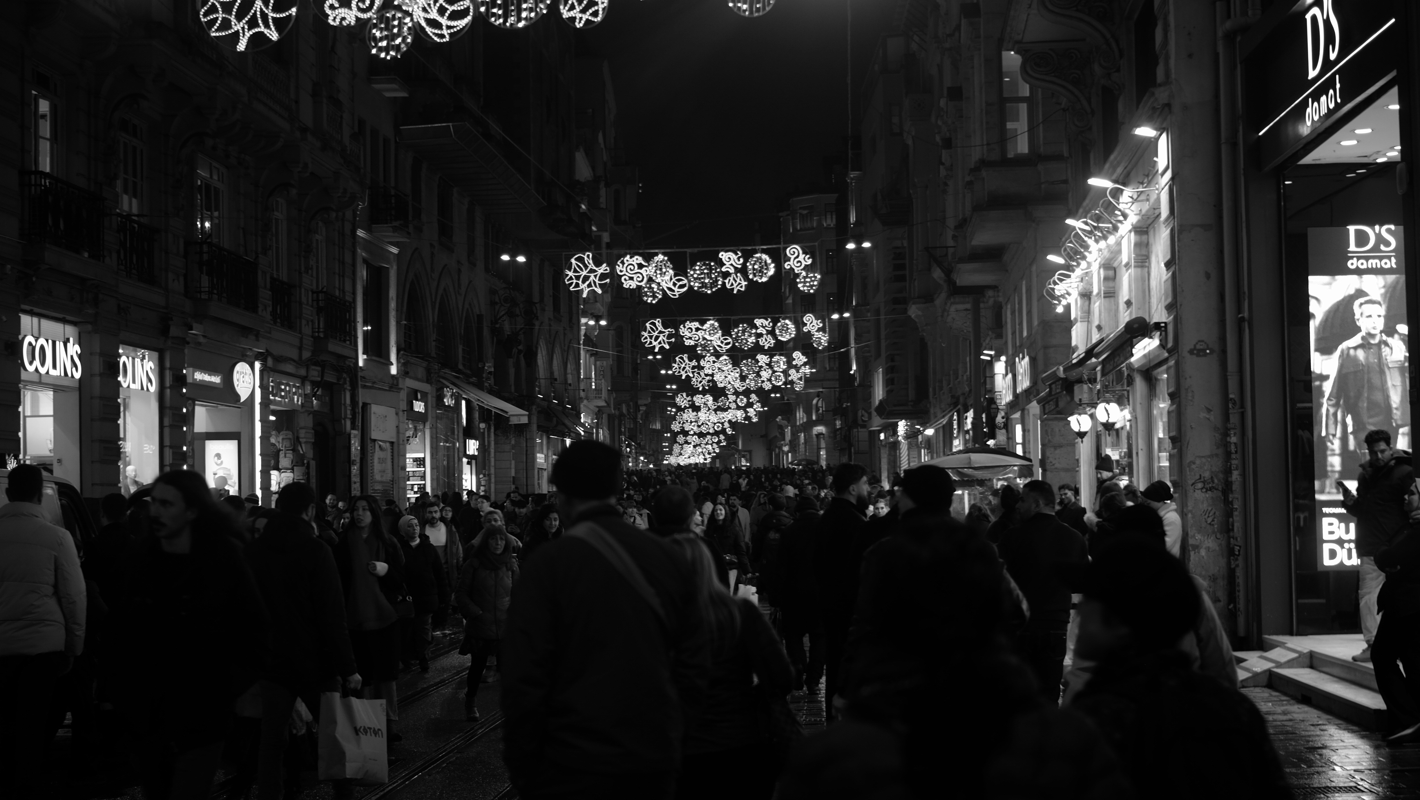 Night Pulse on a Snowflake-lit Street