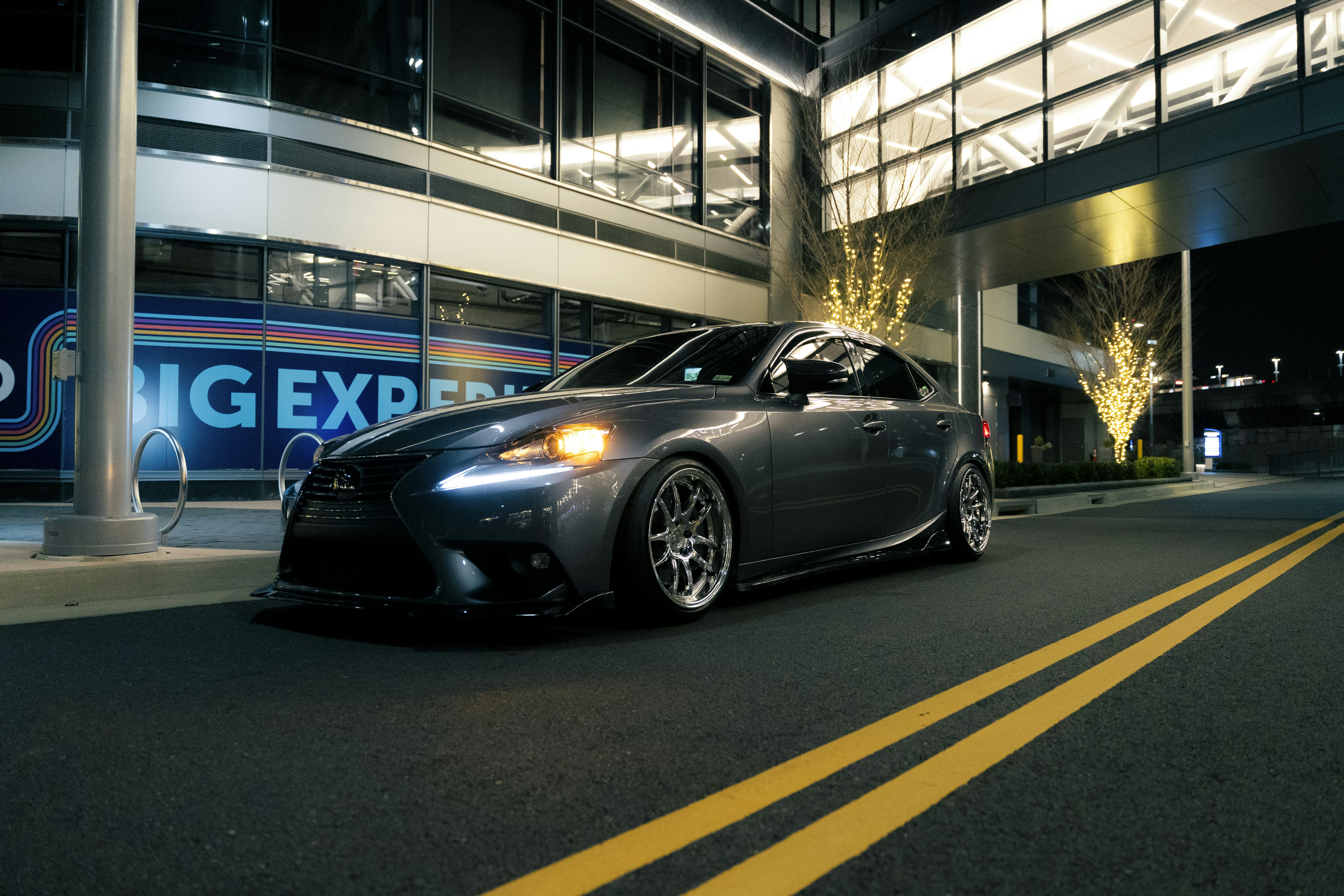 Night Stance: A Shadowy Grand Tourer Anchors the Neon-Glazed Drive