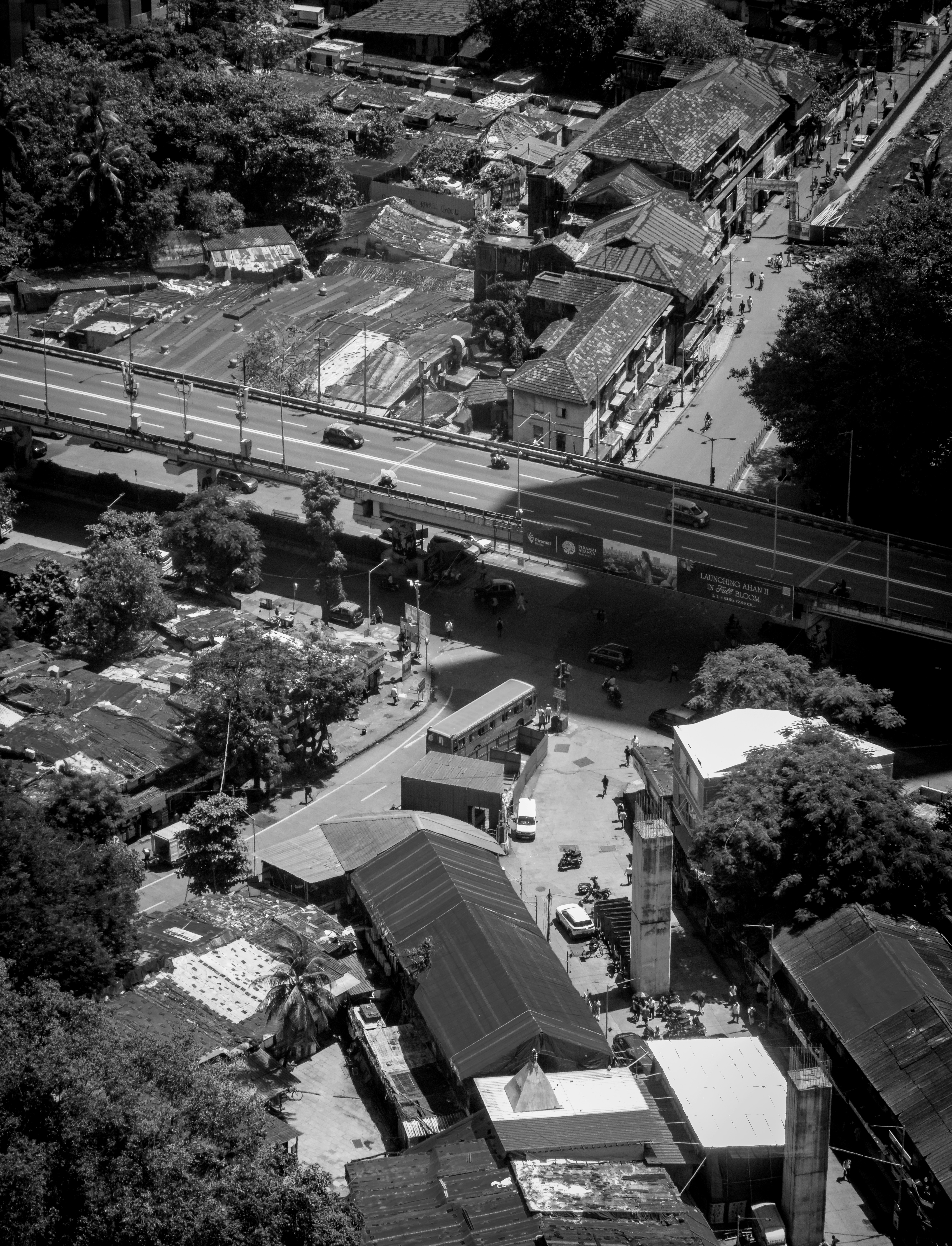 Overpass and Market Threads: Aerial Sketch of a Busy Urban Nook